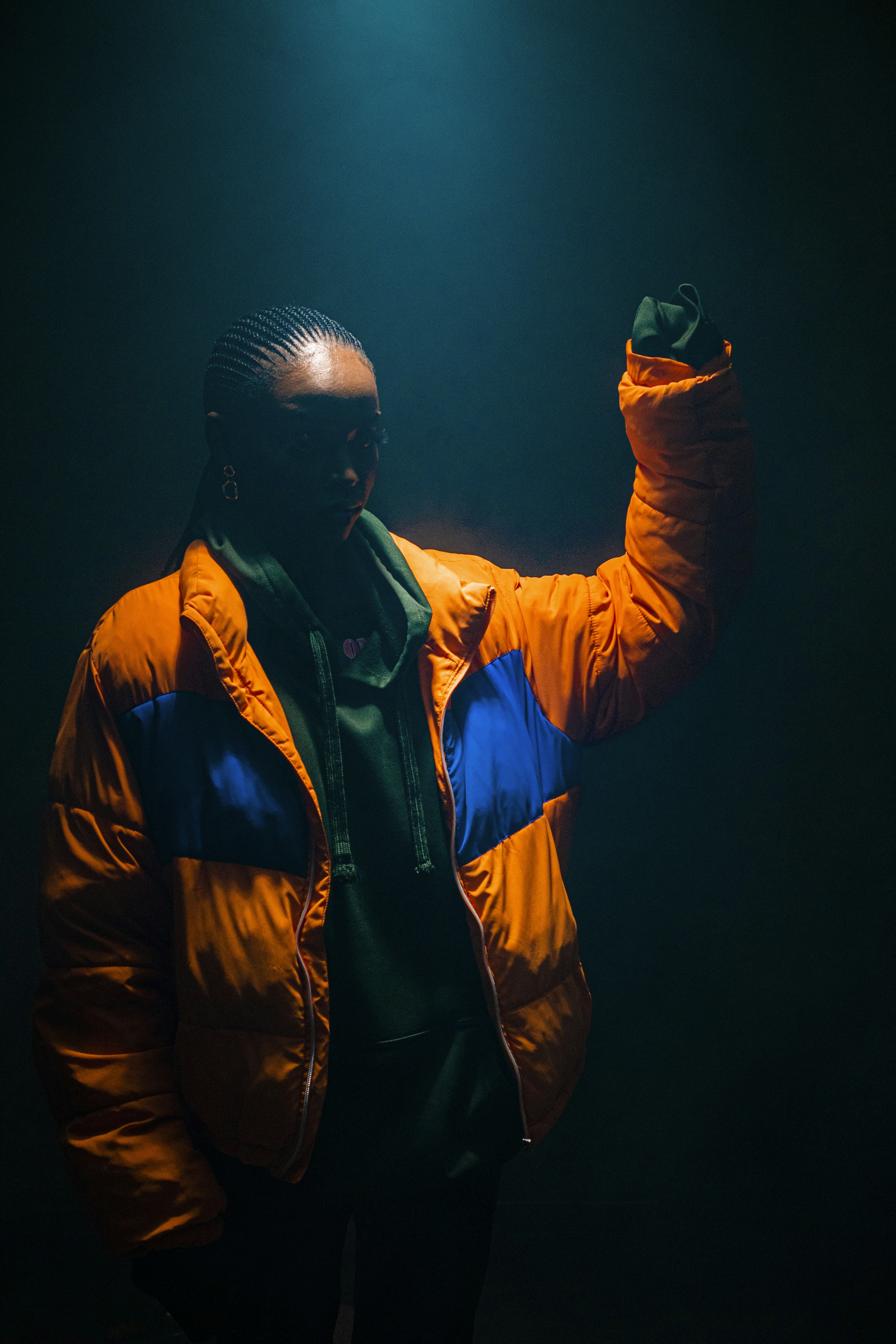 A man in an orange and blue jacket photo – Free Photography Image on ...