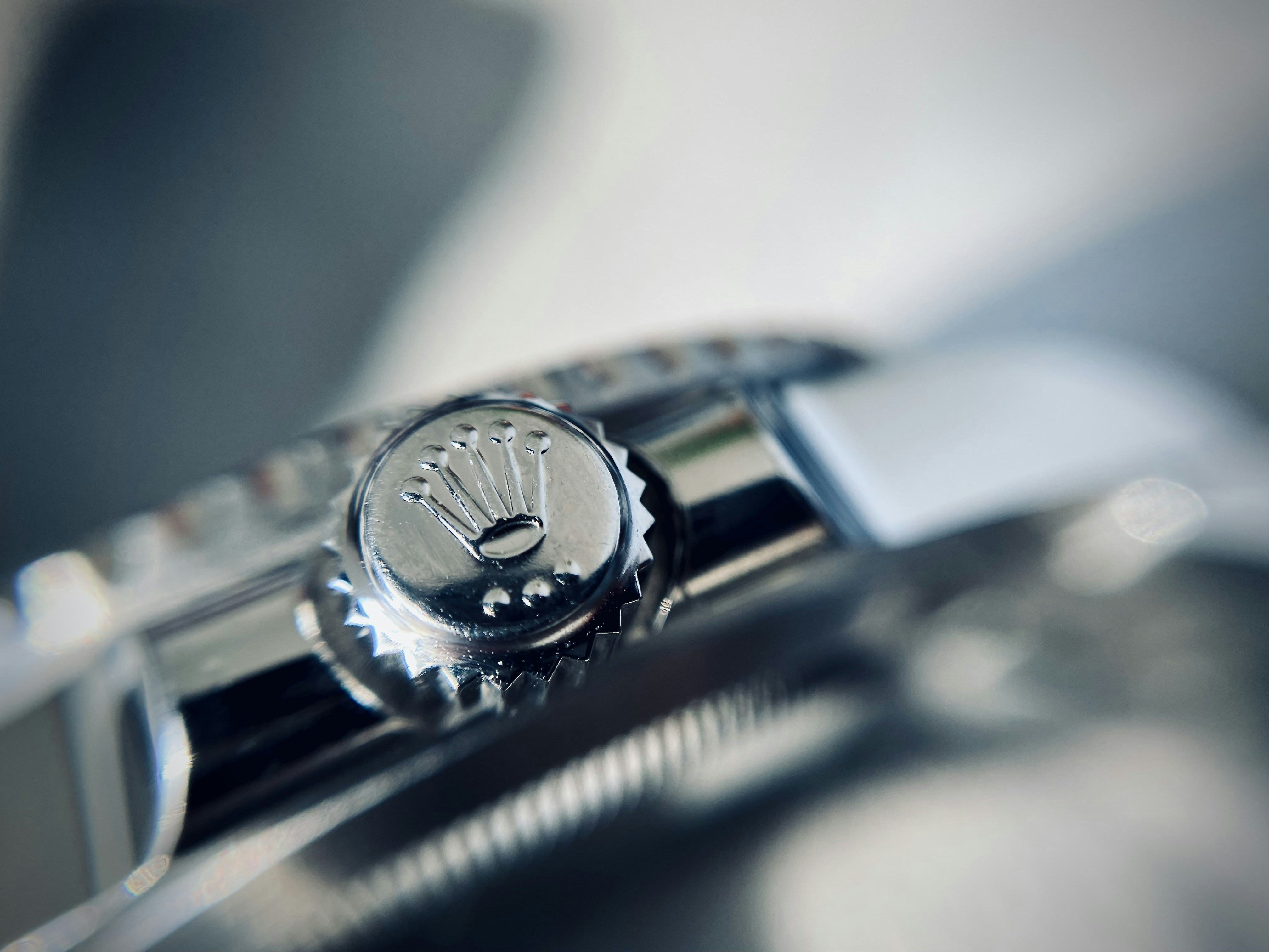 A close up of a rolex watch on a table photo – Free Grey Image on Unsplash