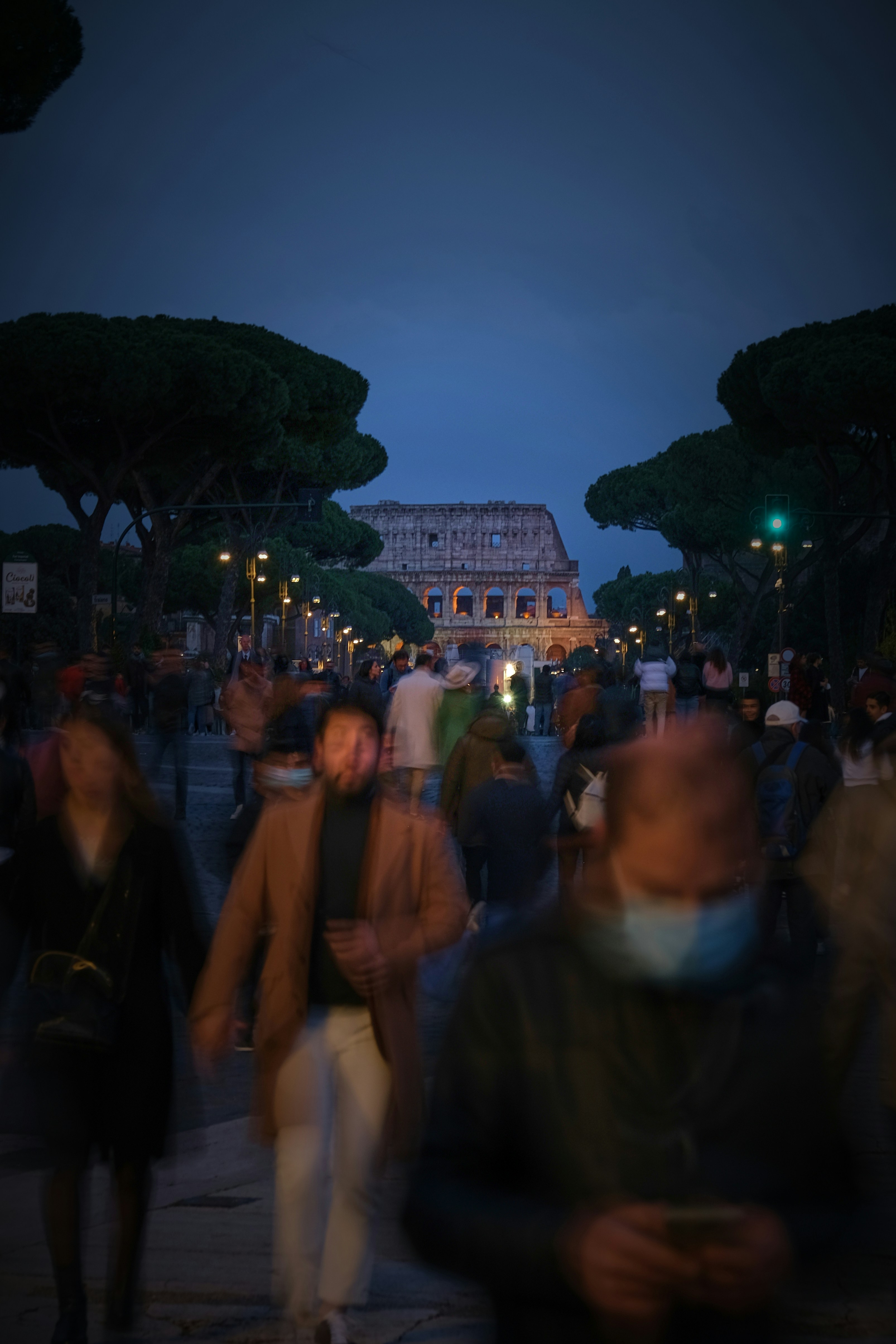 Whispers of the Colosseum: Nighttime Boulevard Through a City of Faces