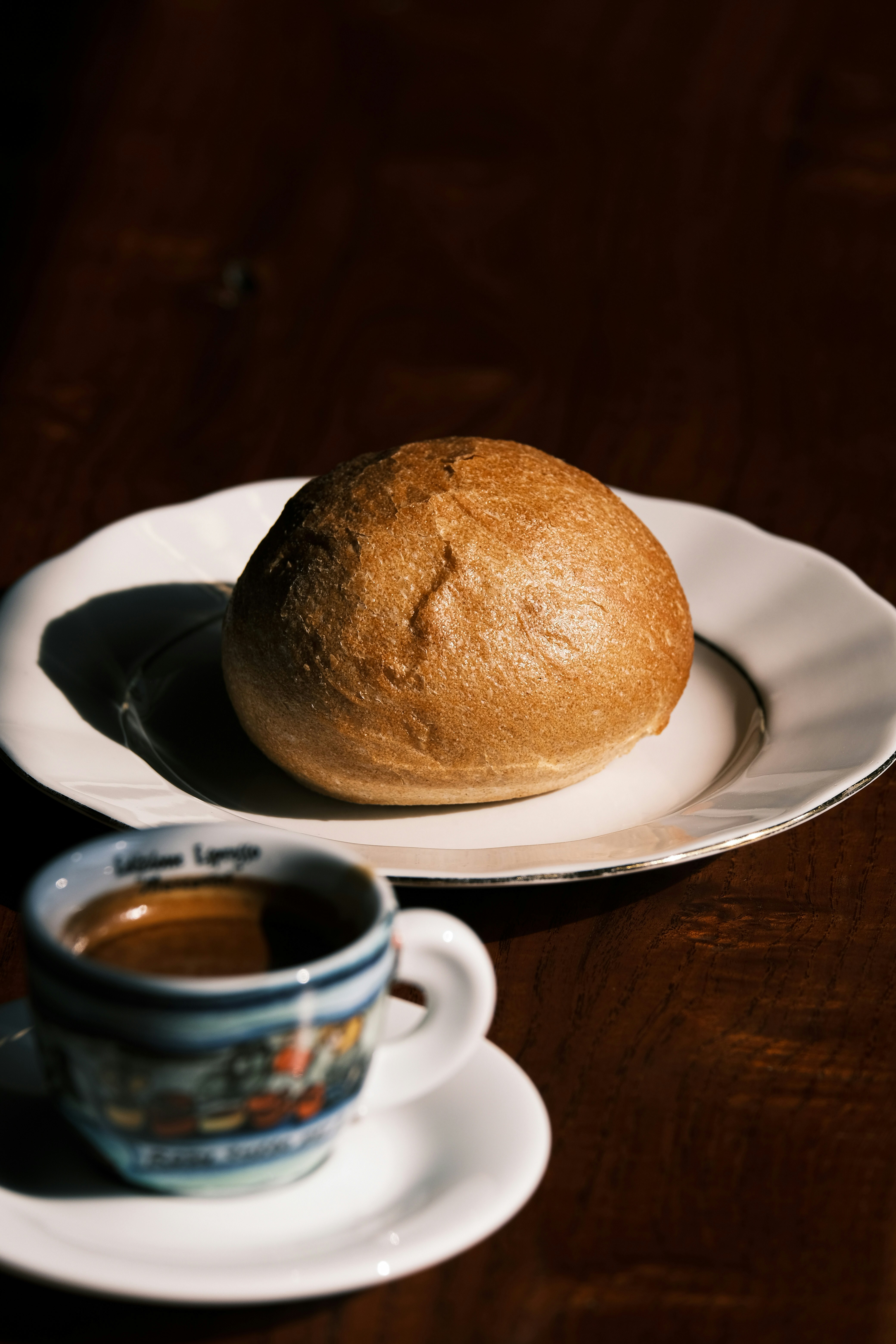 Sunlit Morning Bun on a Quiet Wooden Table