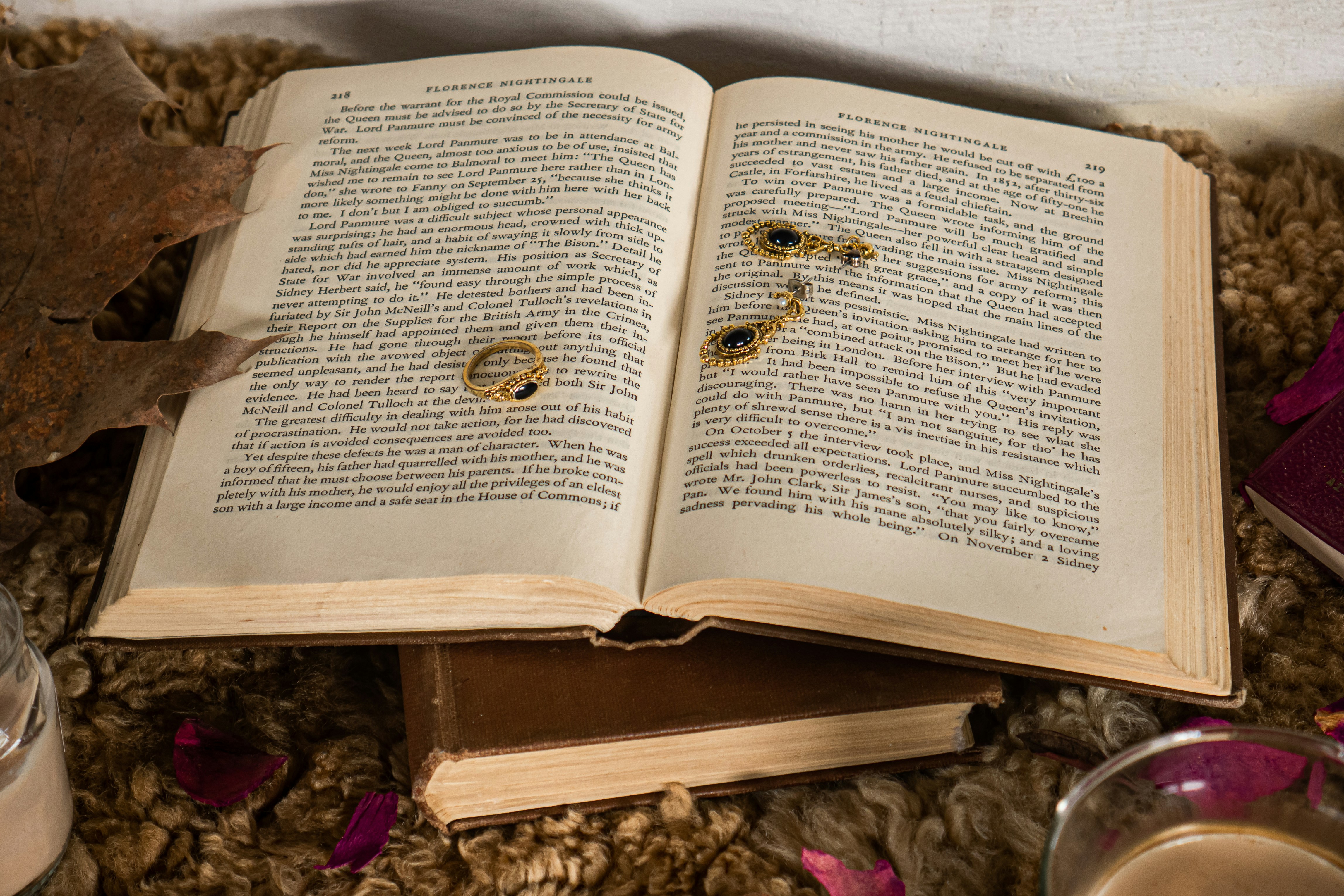 An open book sitting on top of a pile of books photo – Free Old style ...