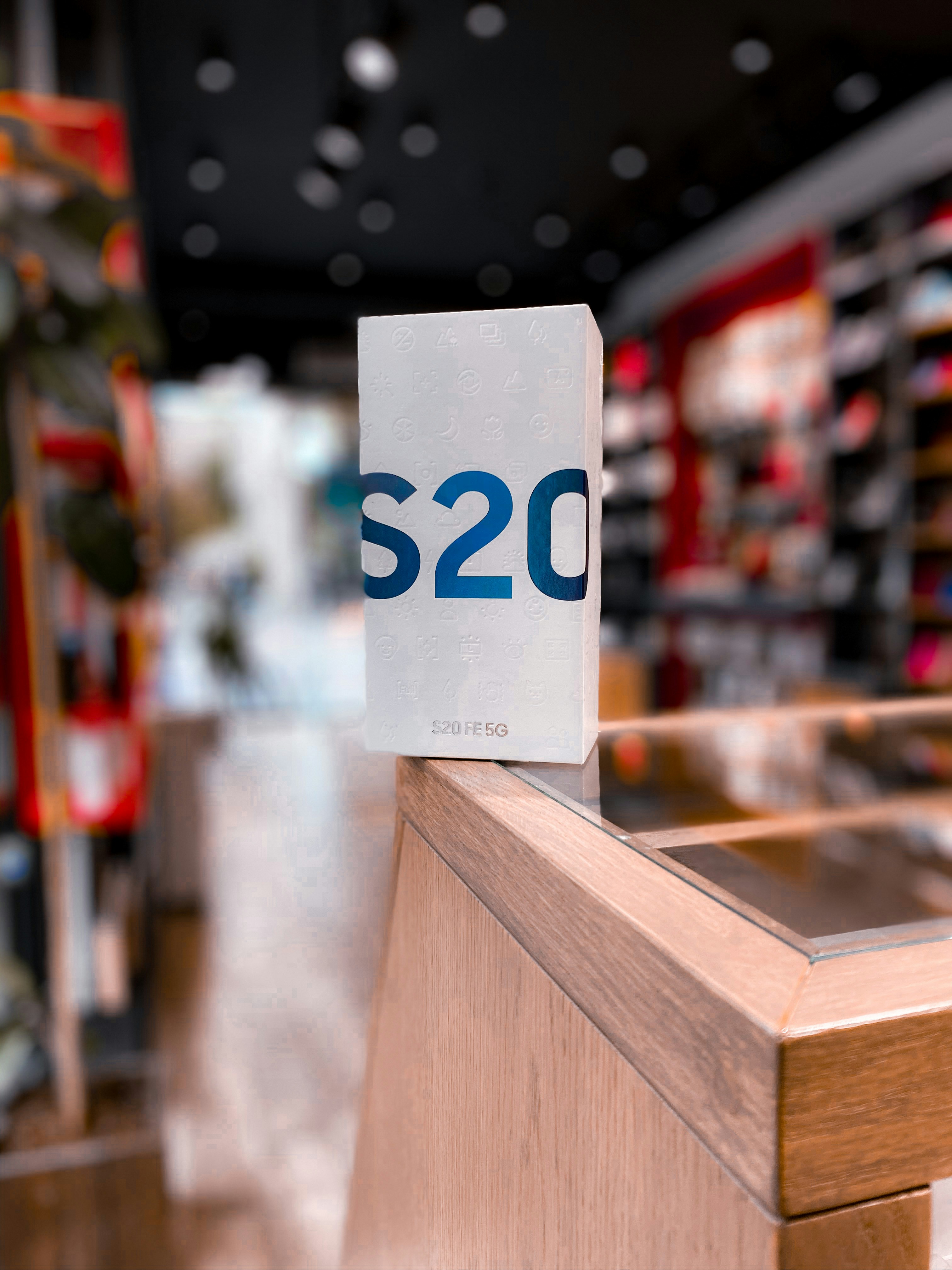Boxed S20 on a Wooden Lip in a Bright Store Aisle