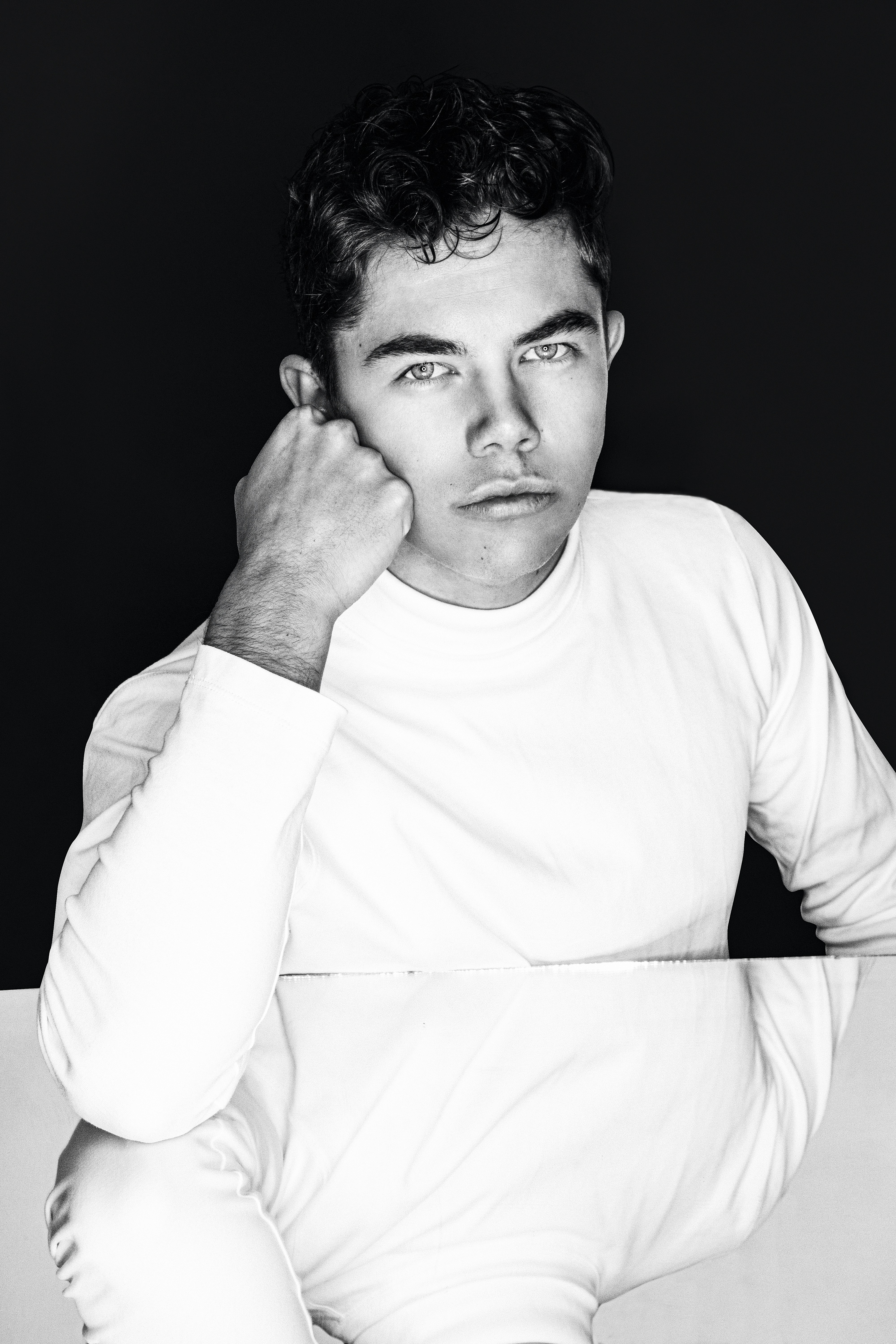 Quiet Gaze in Mono: A Studio Portrait of Contained Intensity