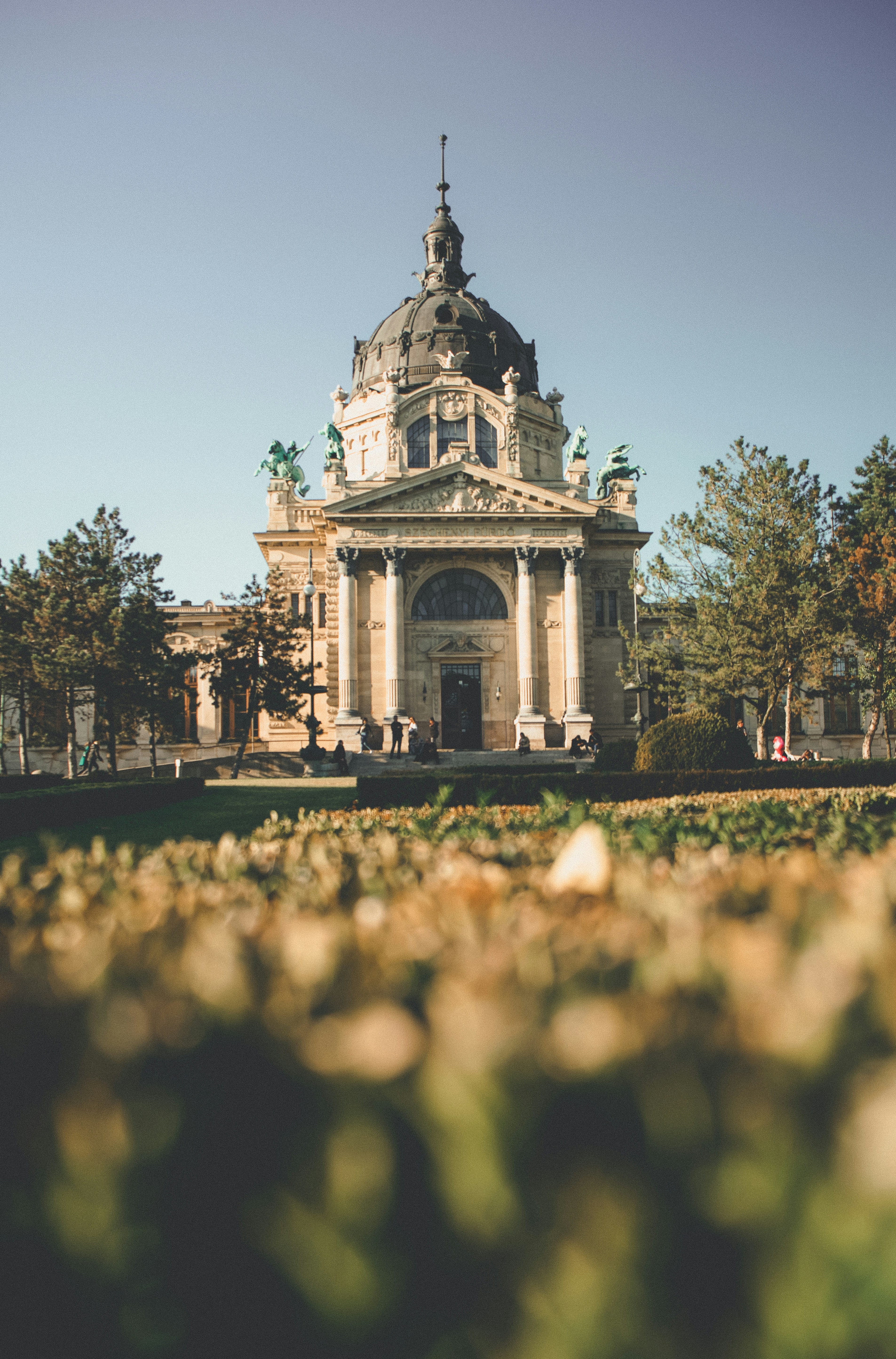 A large building with a clock tower on top of it photo – Free Budapest ...