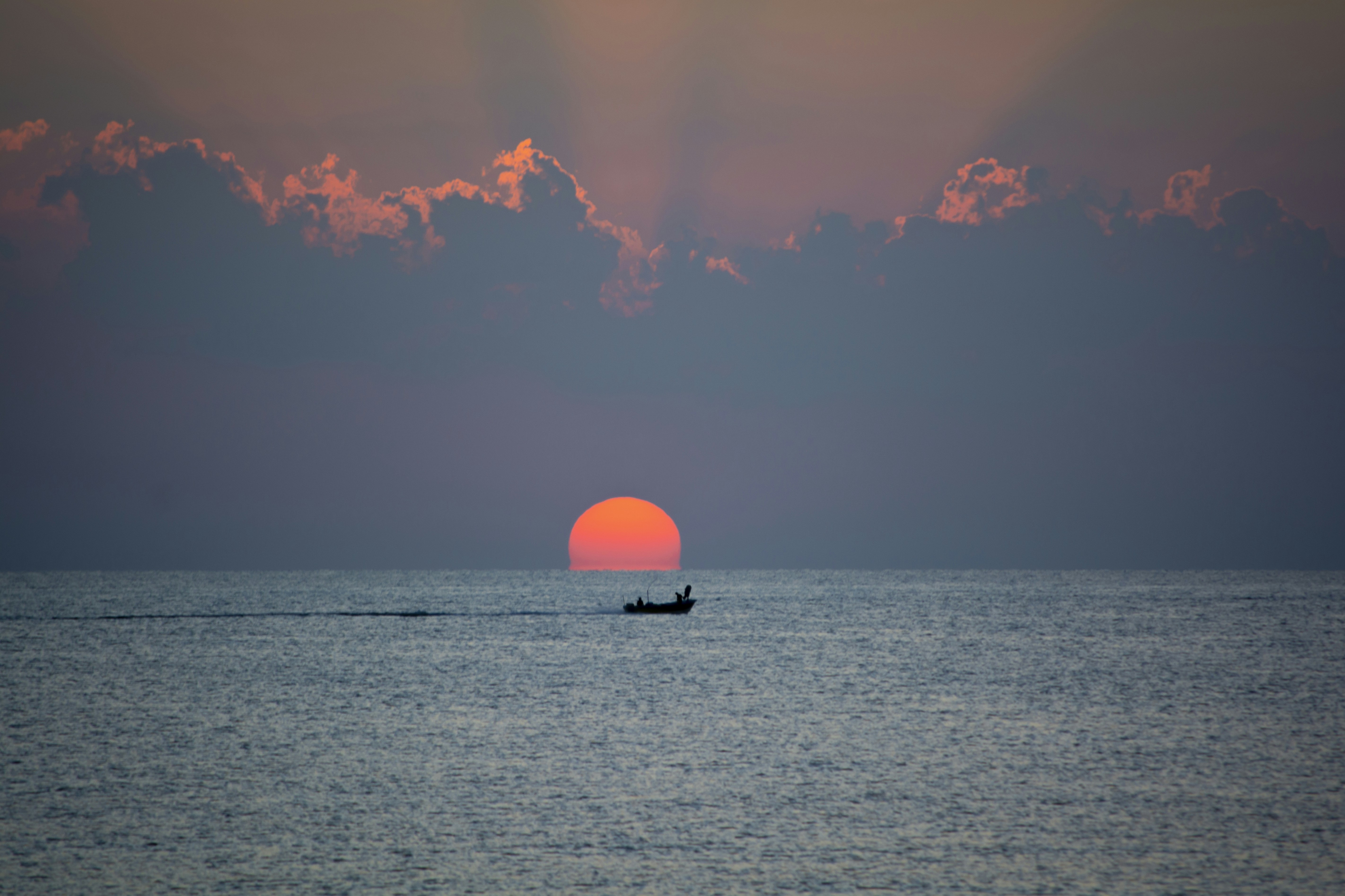 Sunset Voyage: Tranquil Seas