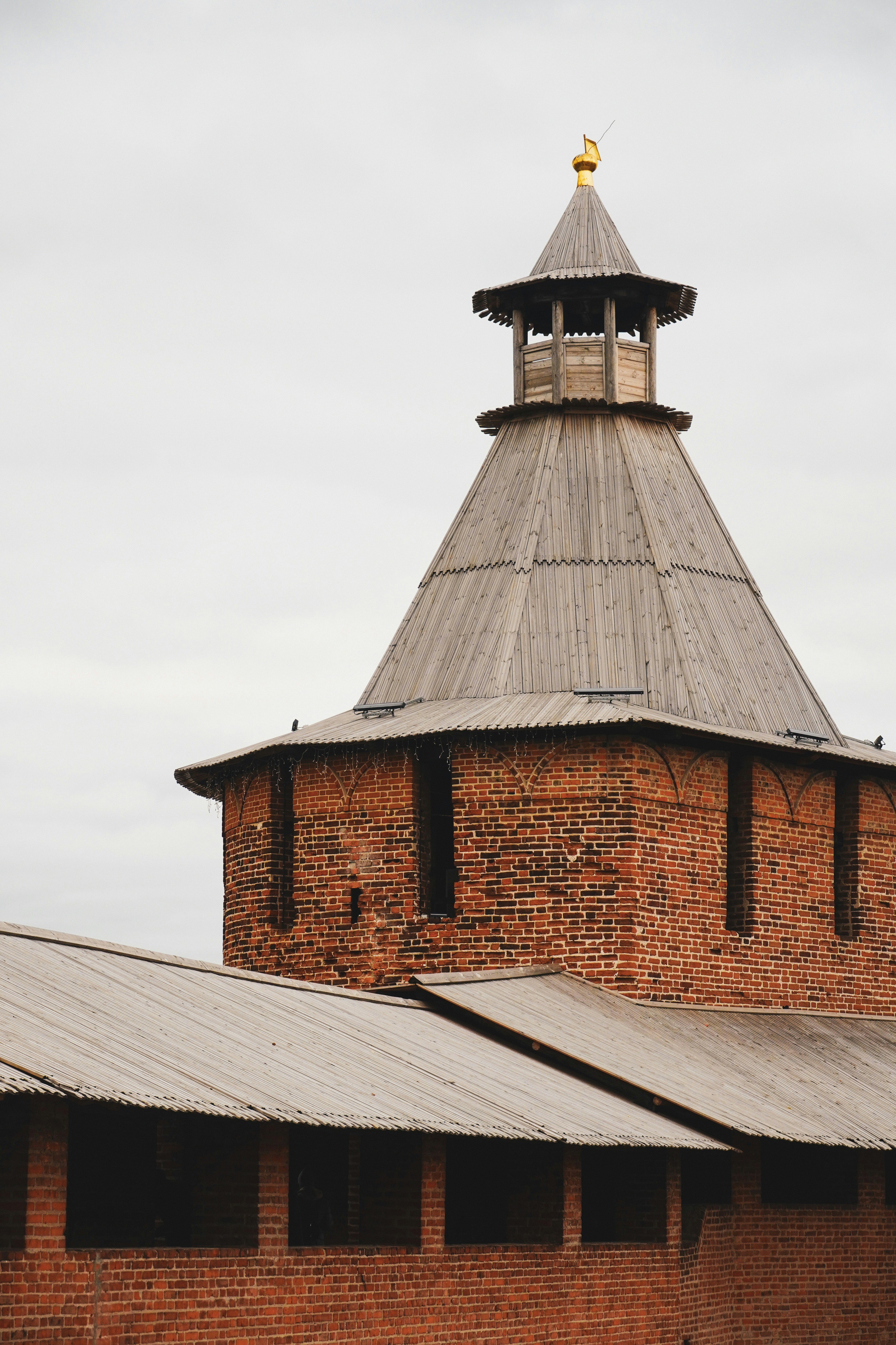 Timbered Turret Above Brickwork: A Historic Roofline