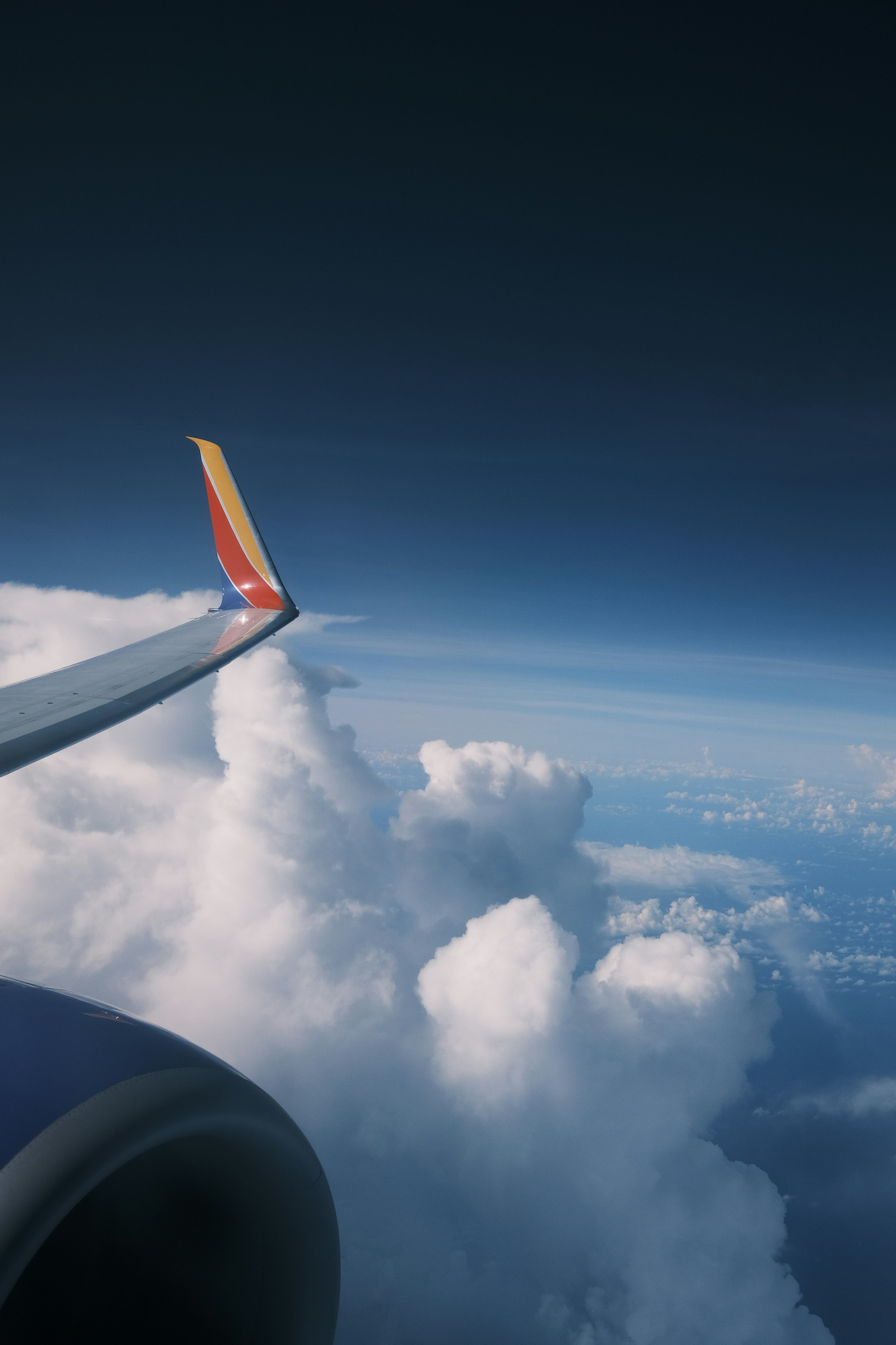 Edge of the Sky: A Winglet Meeting the Clouds
