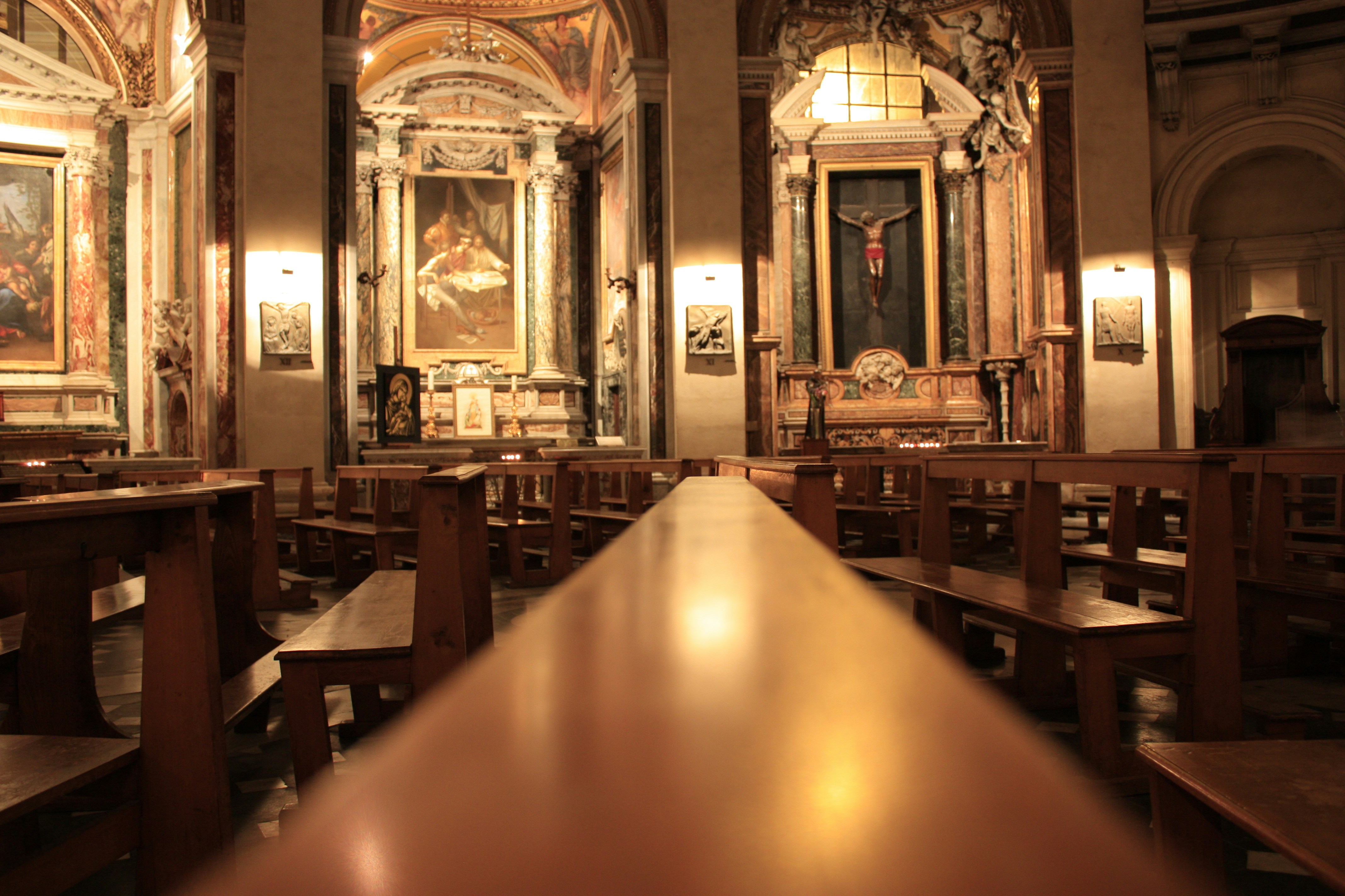Beautiful photo from a convent in Italy. 2015. | a long table in a large room with paintings on the walls