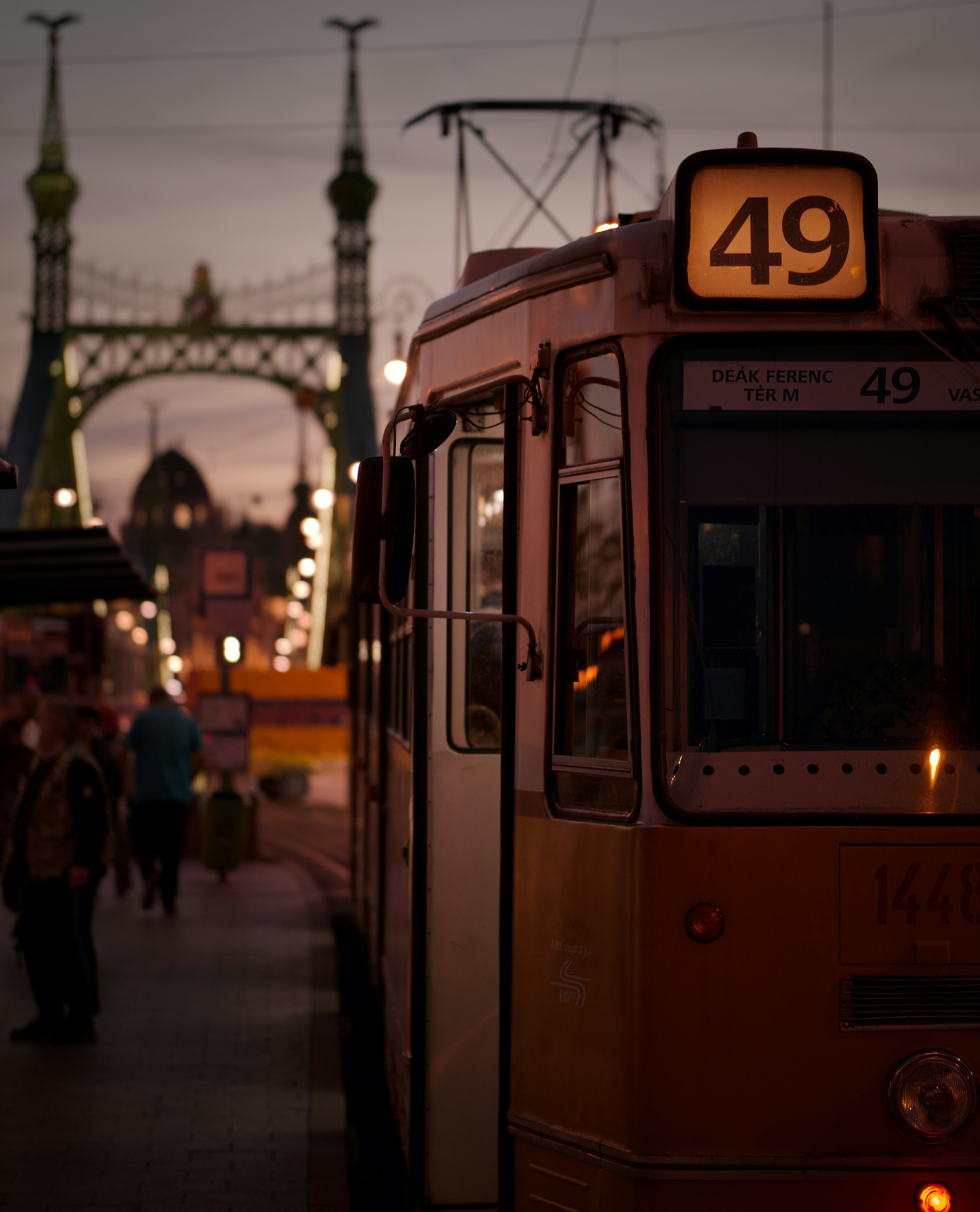 Evening Tram at a City Archway
