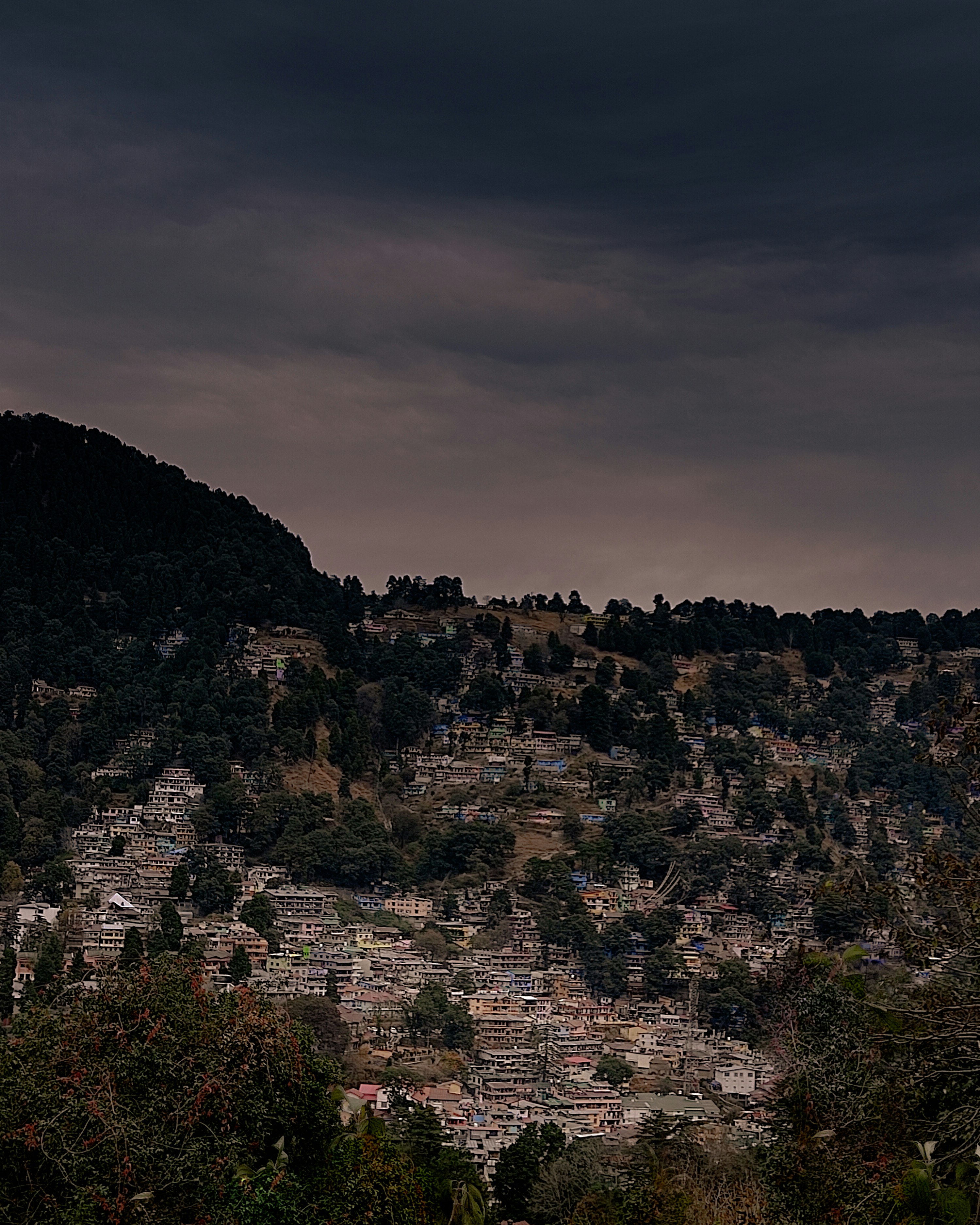 Terraced Twilight: A Mountain Village Clinging to the Slope