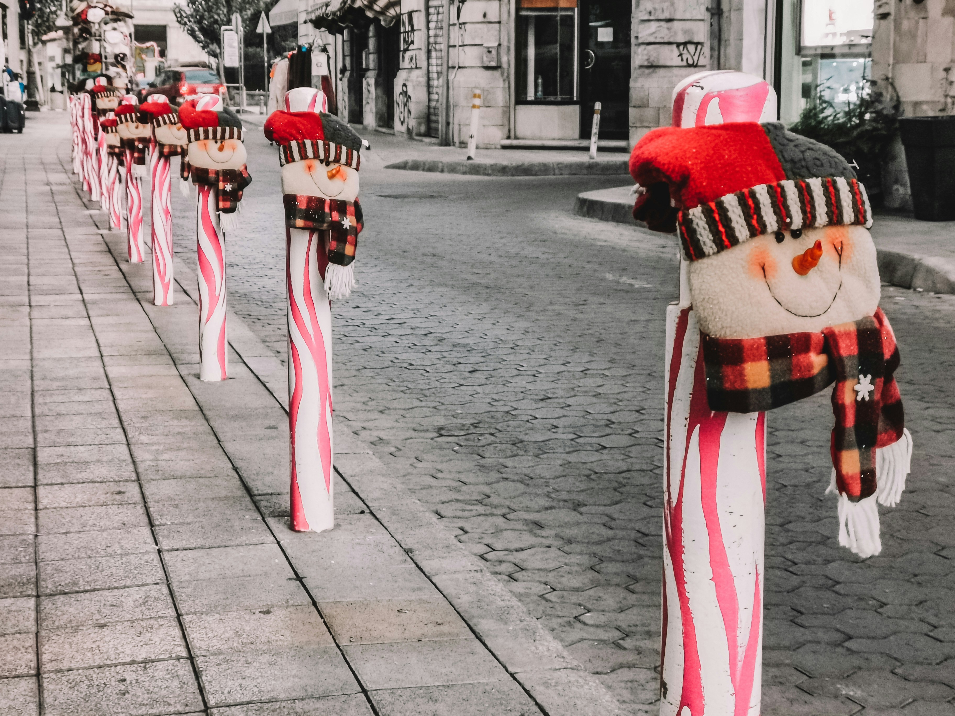 Candy Cane Row with Knit-Wrapped Figures as Street Garland