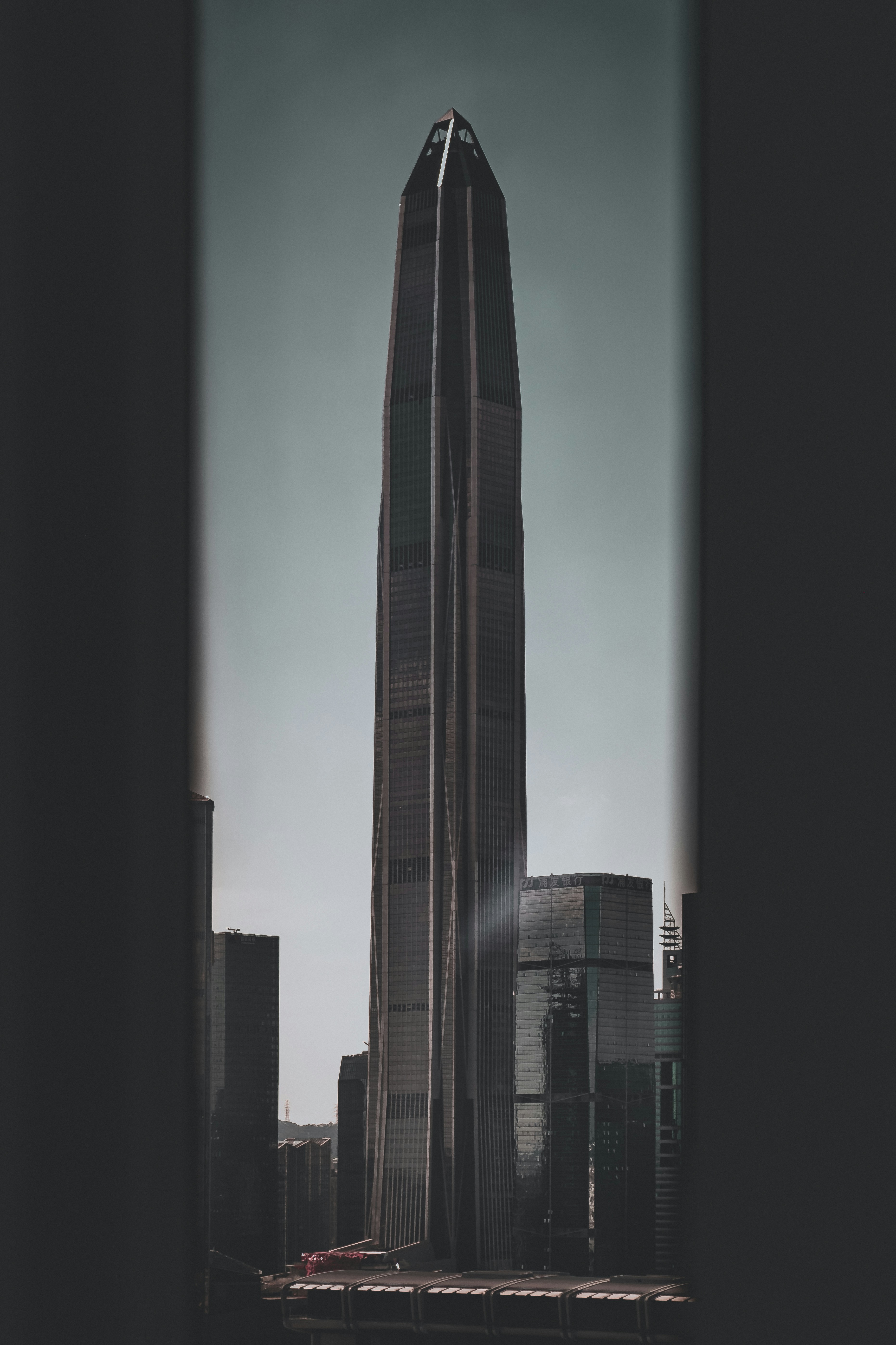 a very tall building in the middle of a city