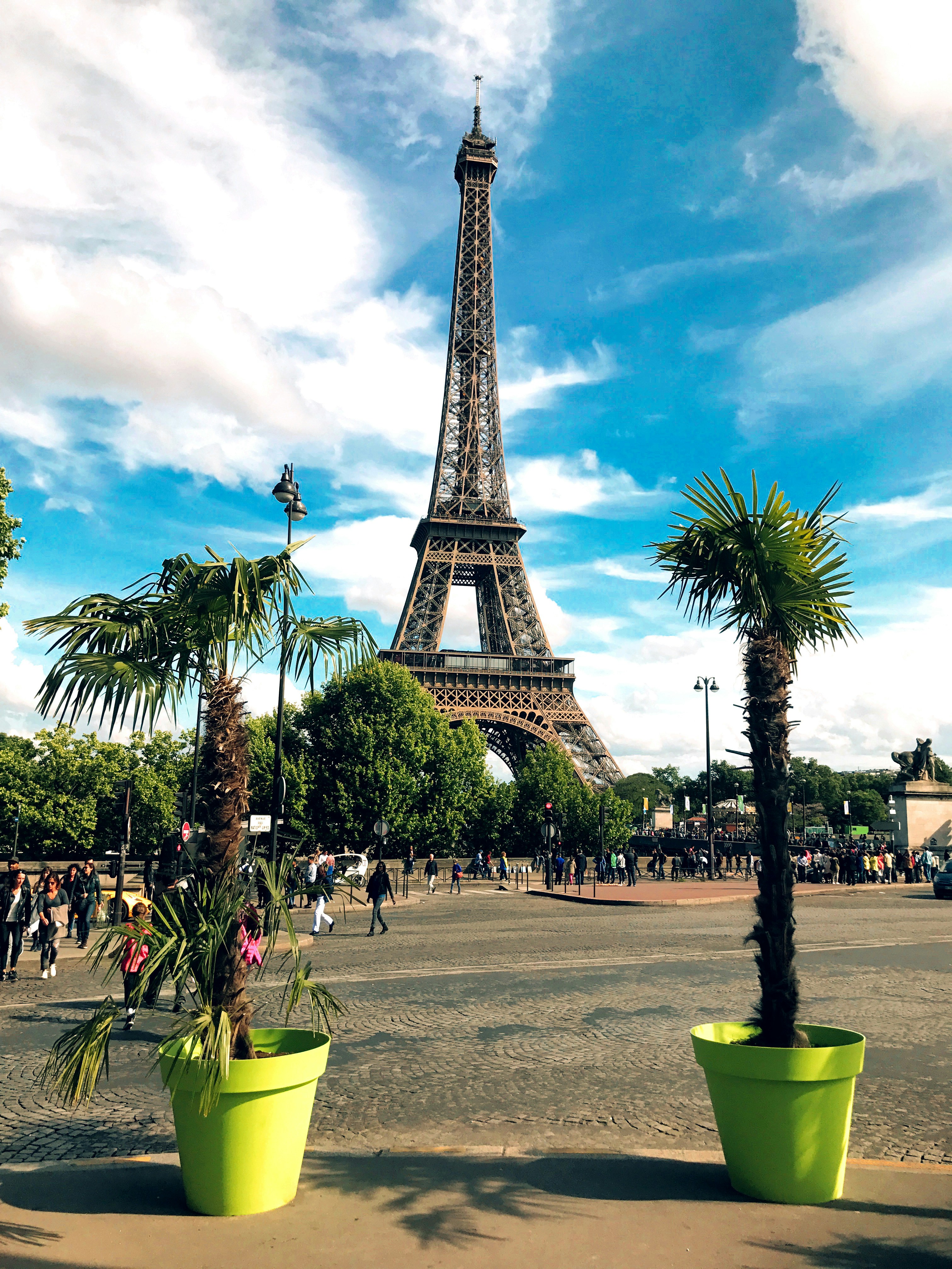 The eiffel tower towering over the city of paris photo – Free Portrait ...