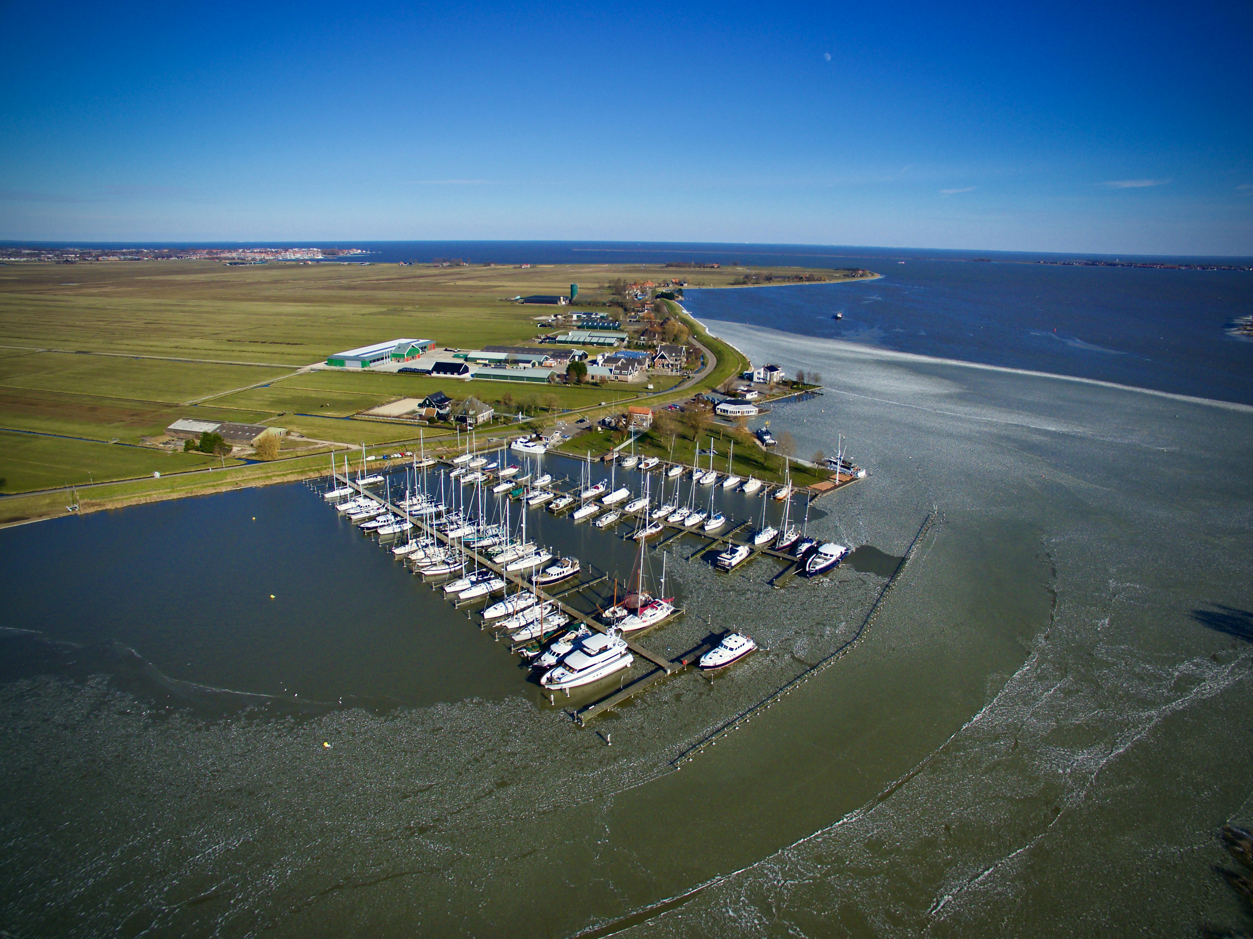 An aerial view of a marina with many boats photo – Free Hol Image on ...