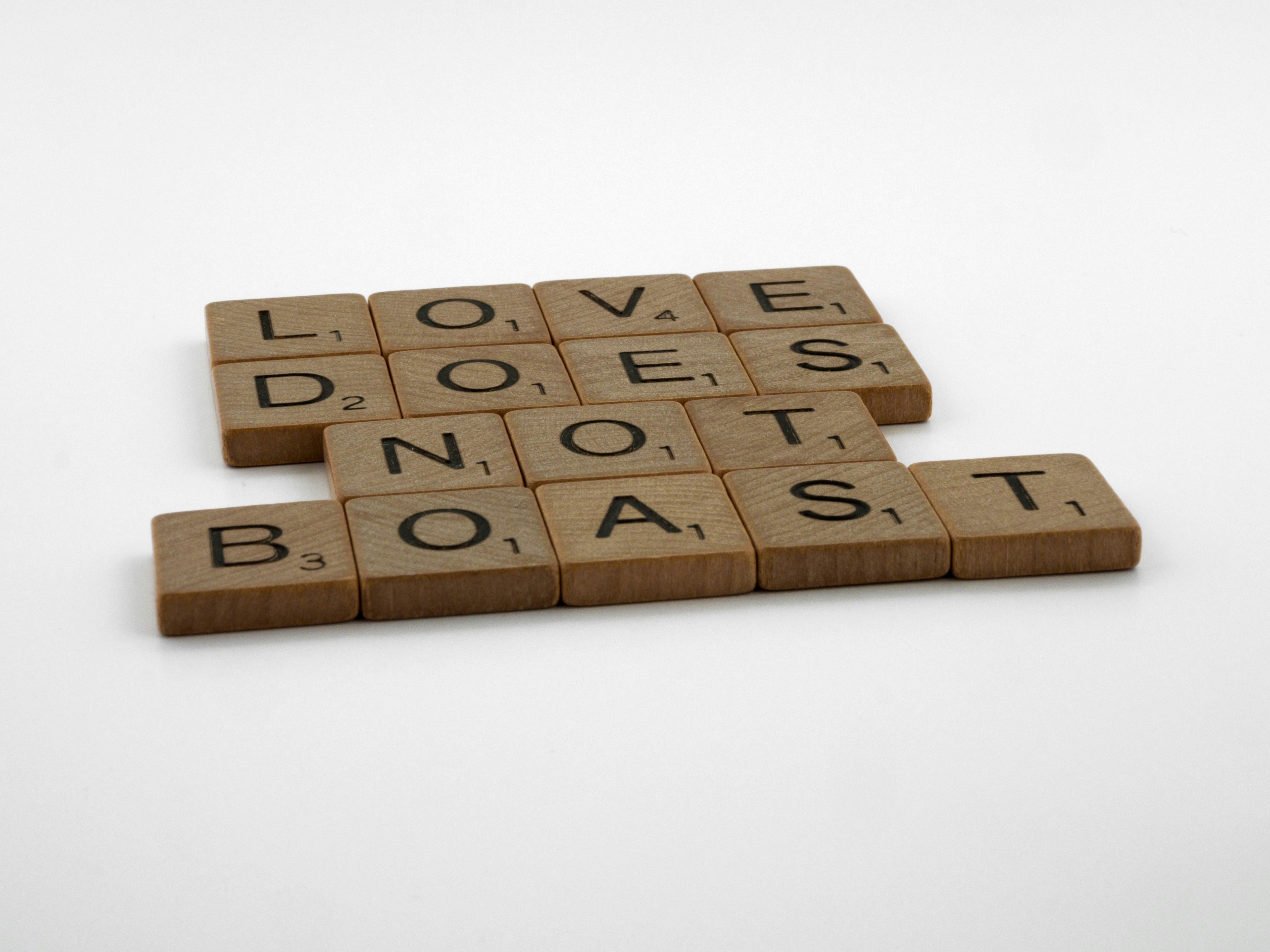 Scrabble tiles spelling love does not boat photo – Free Grey Image on ...