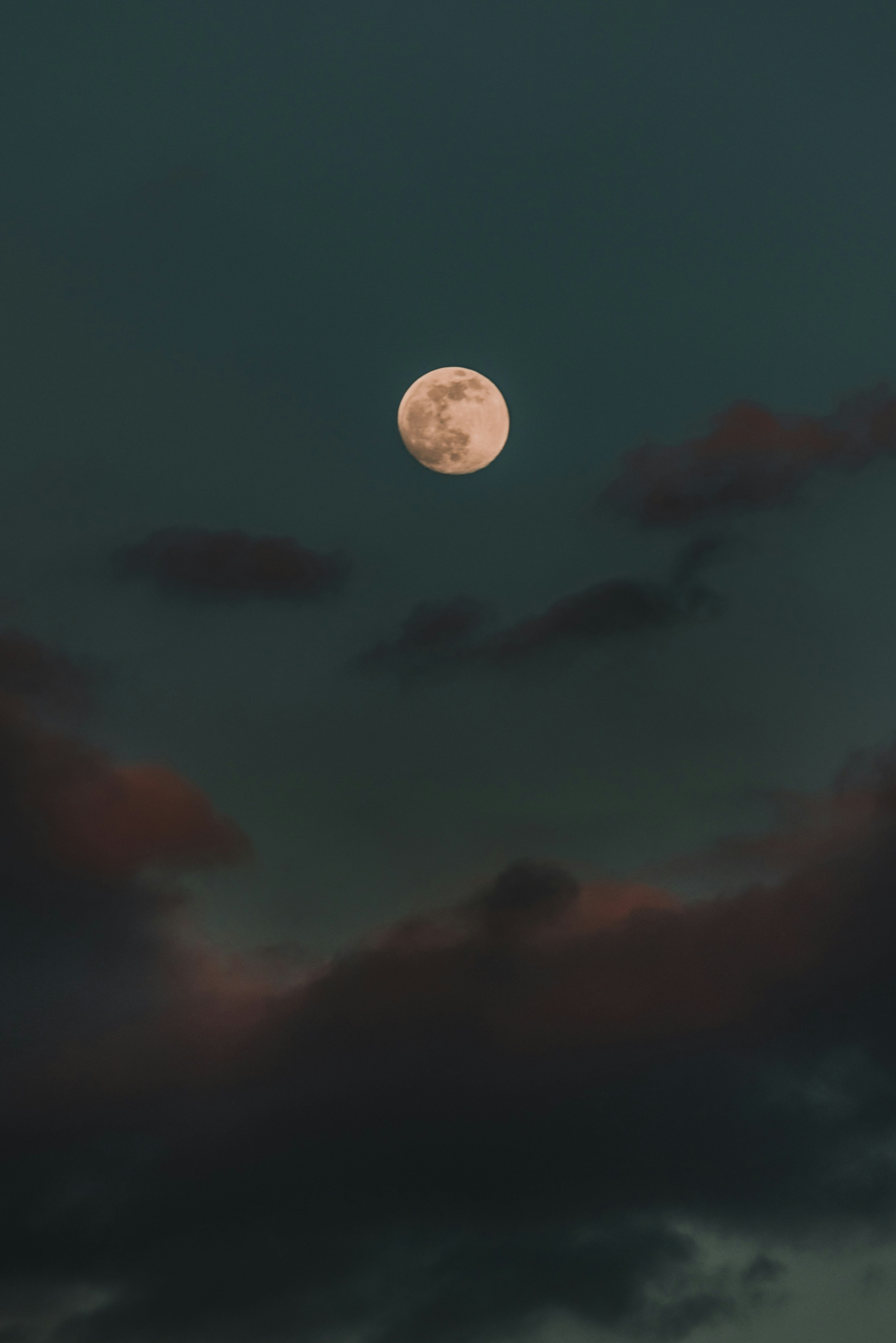 A full moon in the sky with clouds photo – Free Moon Image on Unsplash