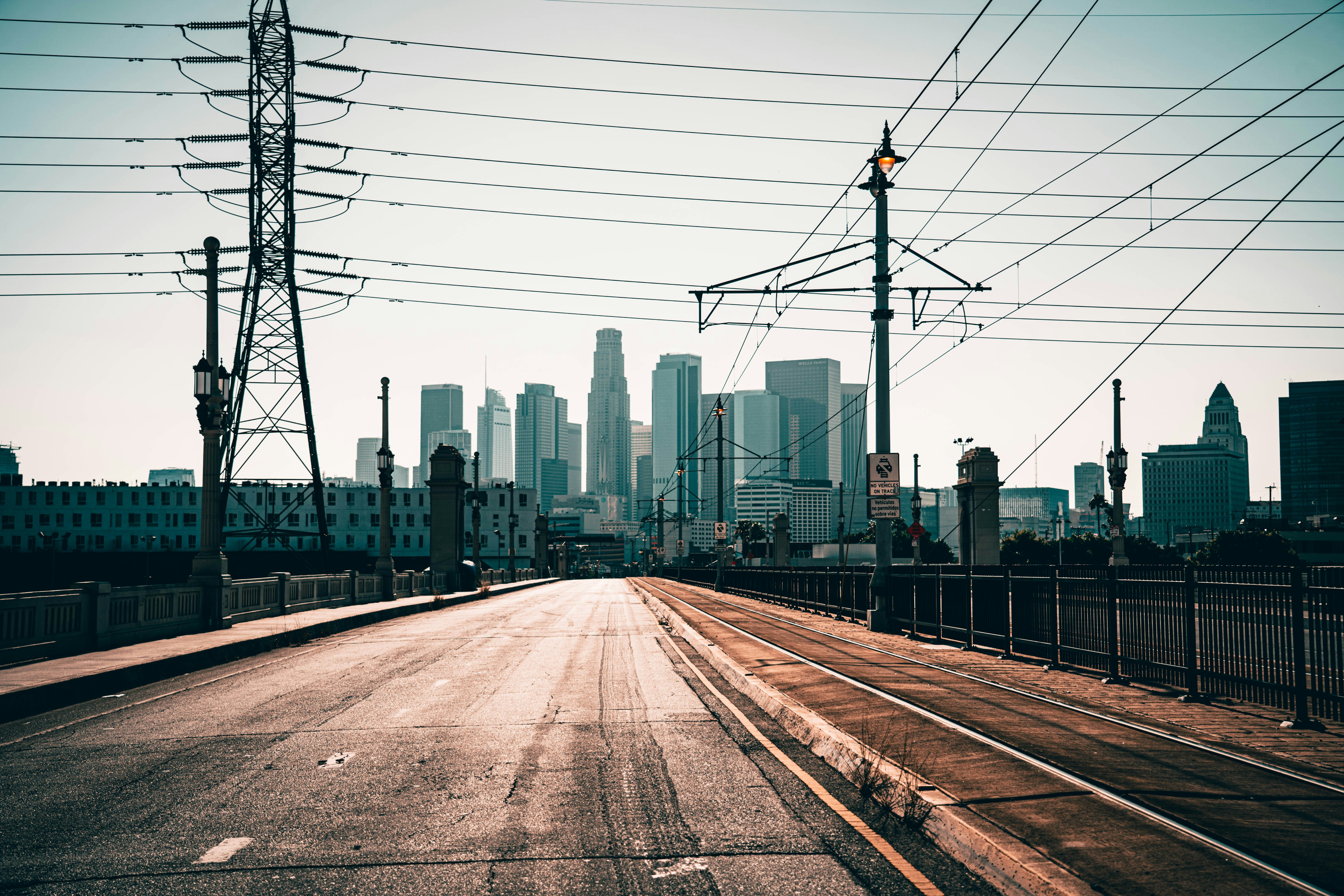 A long train going down the street photo – Free Los angeles Image on ...