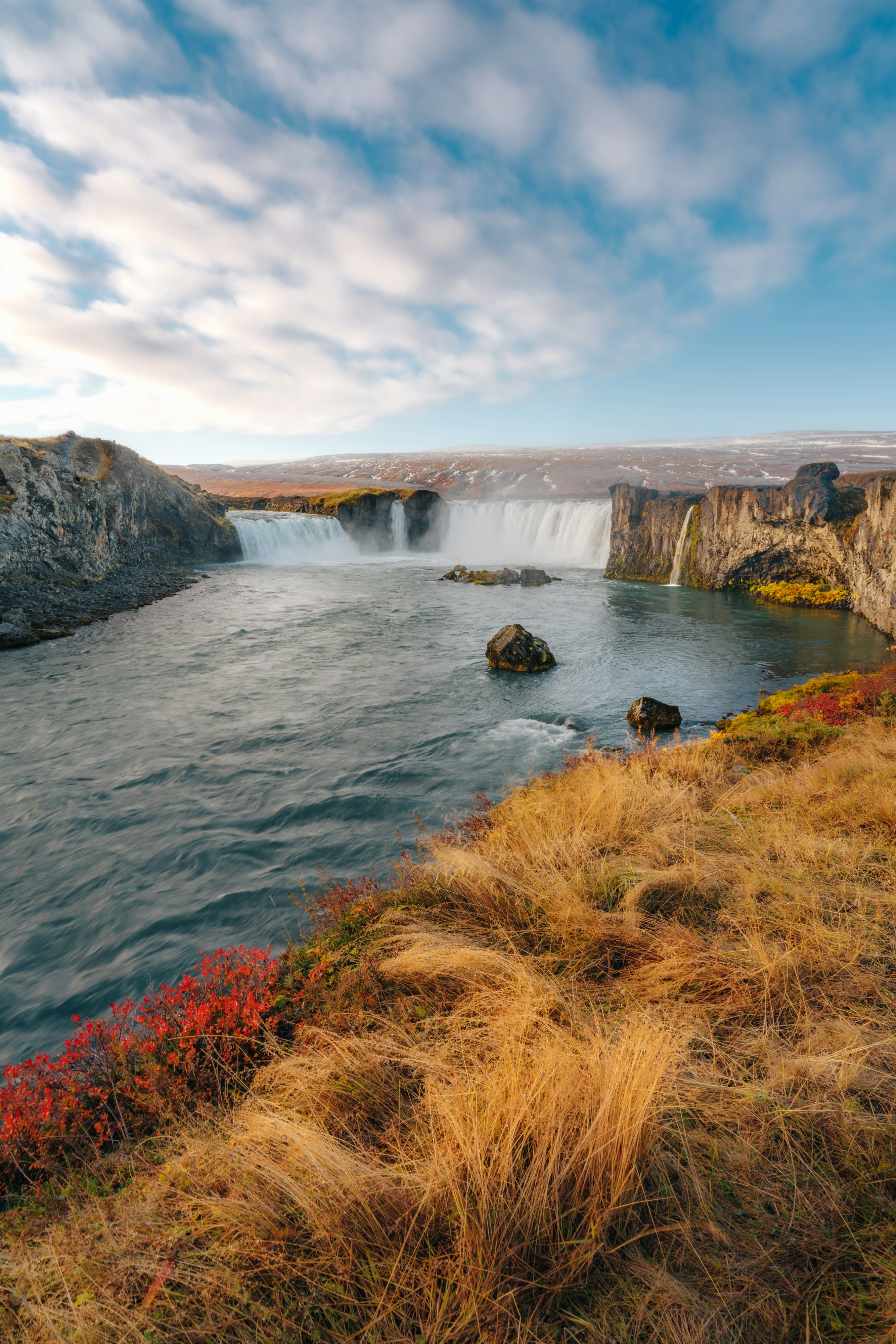 Autumn Gorge Cascade: Golden Grass Framing a Wide Waterfall