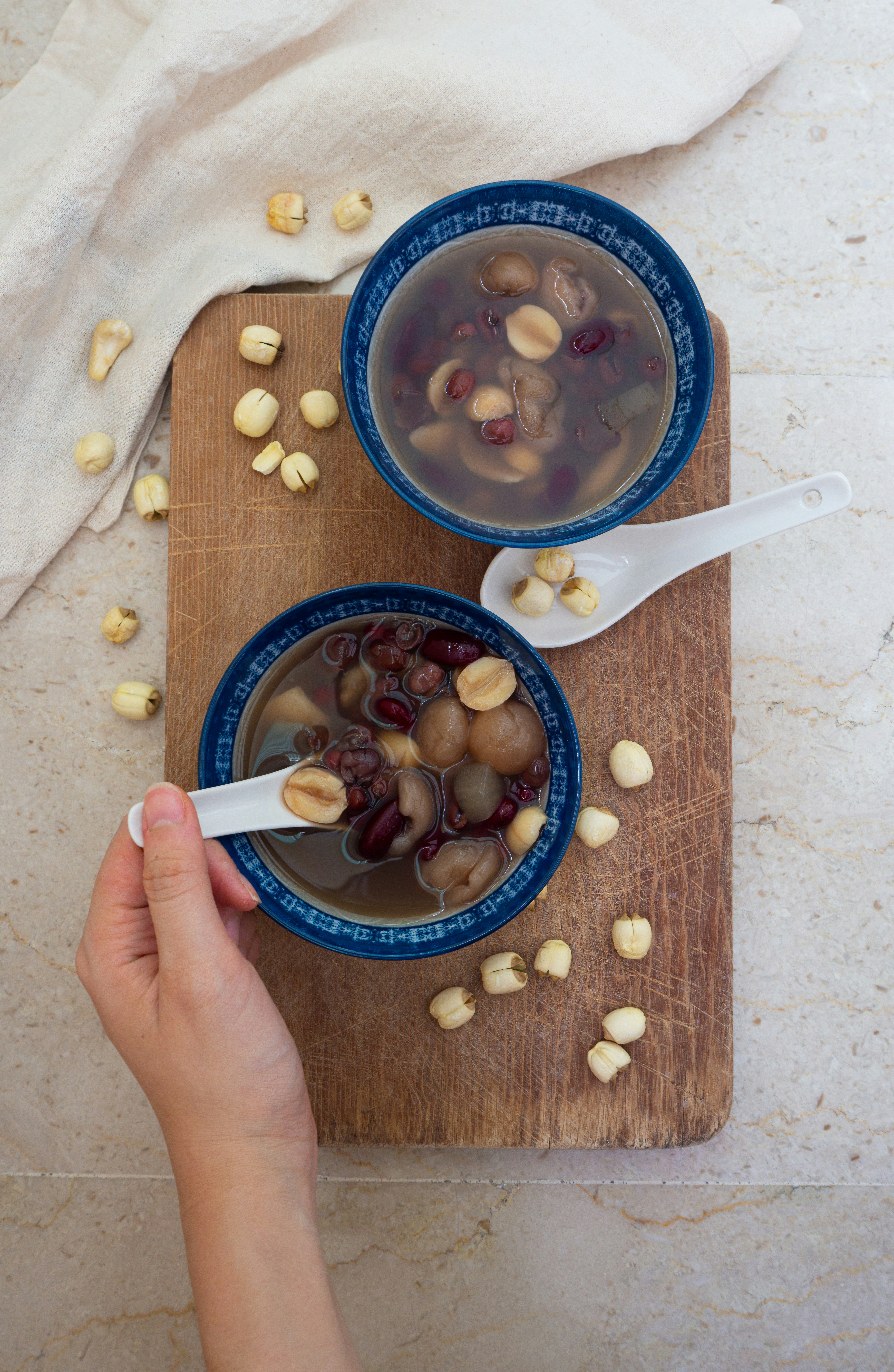 Blue Ceramics and a Handful of Comfort: A Quiet Moment Over Soup