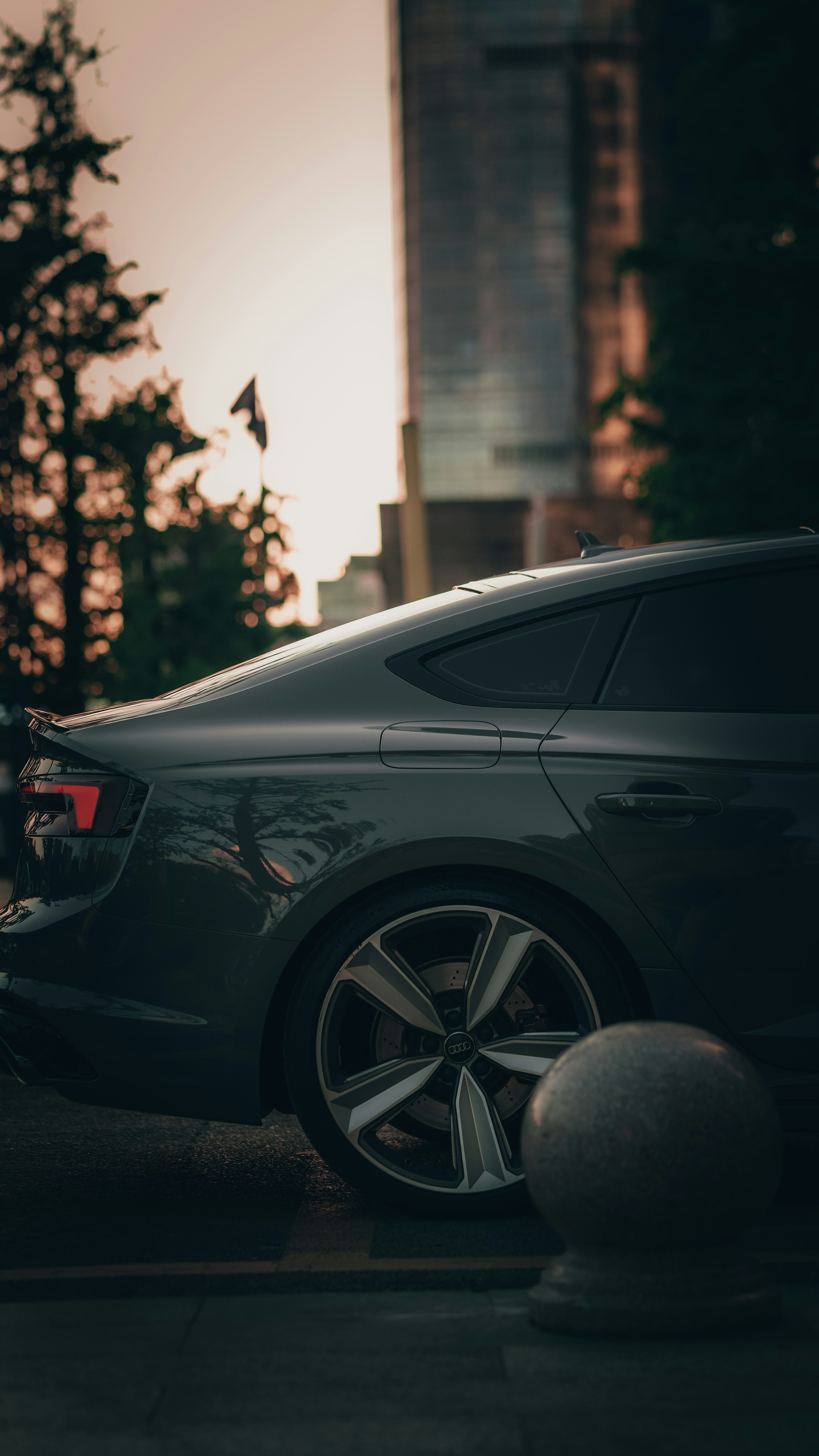 Shadowed Coupe: A City Sunset Resting by the Curve