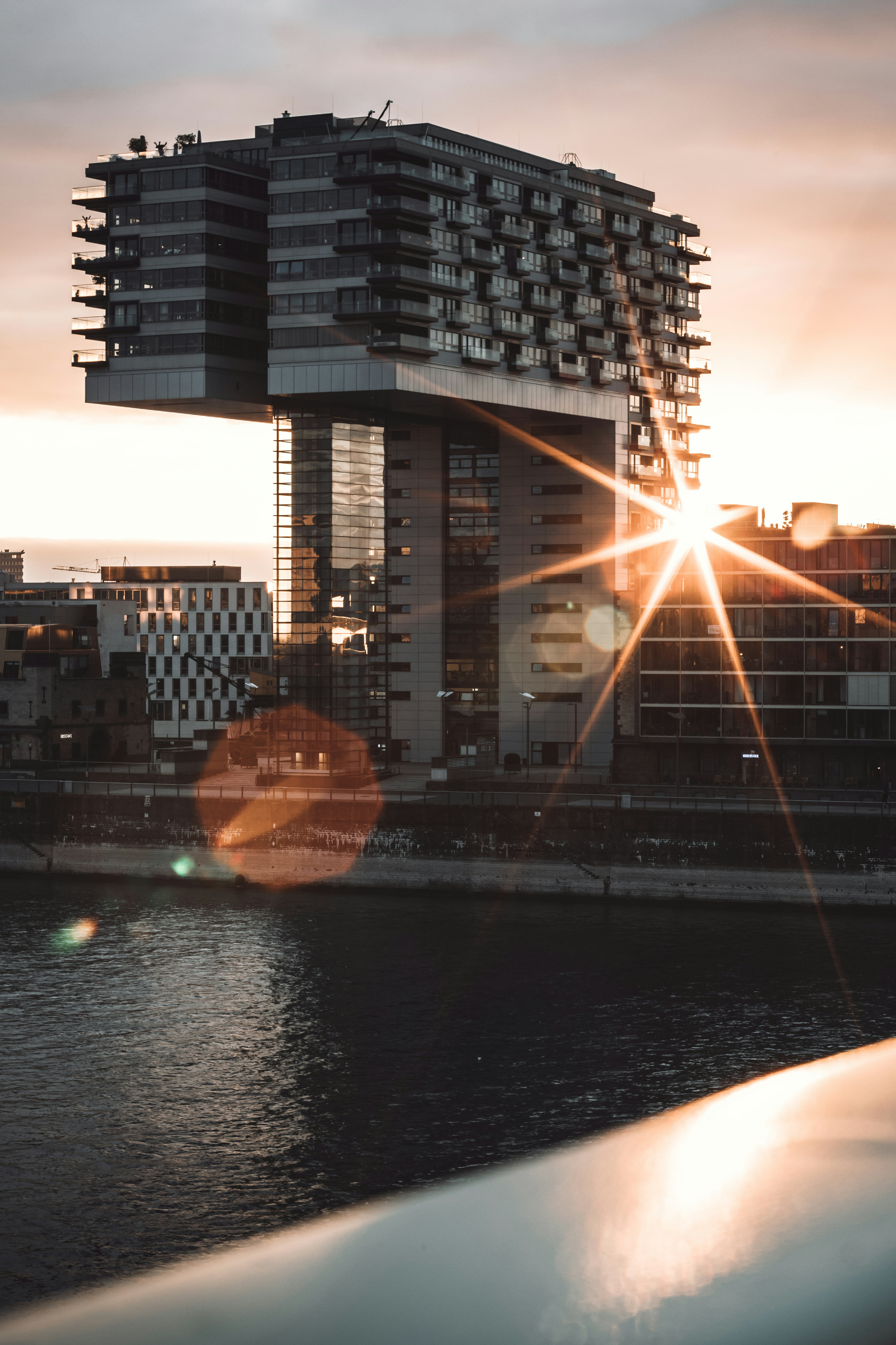 The sun is shining brightly over a city photo – Free Cologne Image on ...