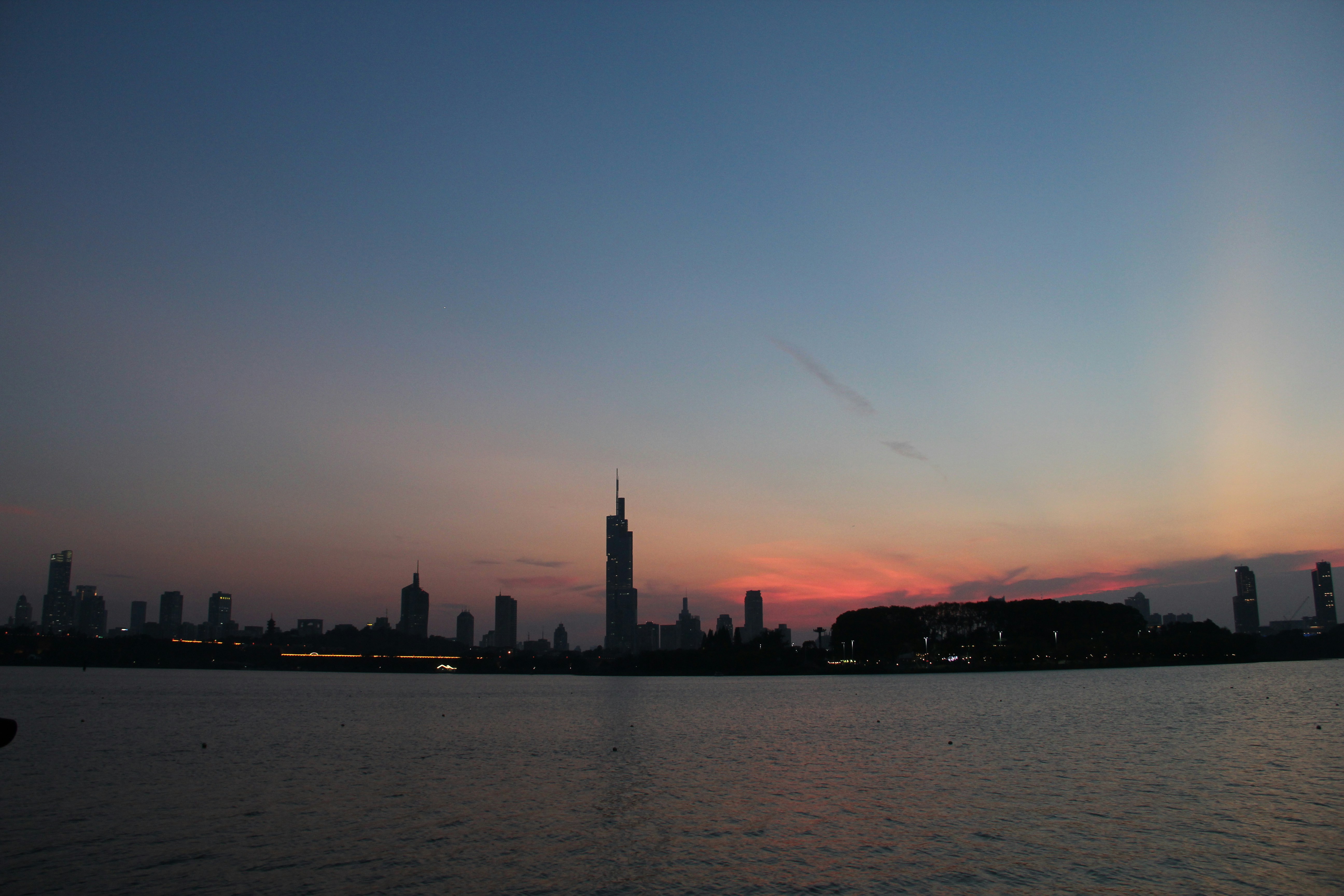 Dusk Silhouette Over a Quiet Waterfront
