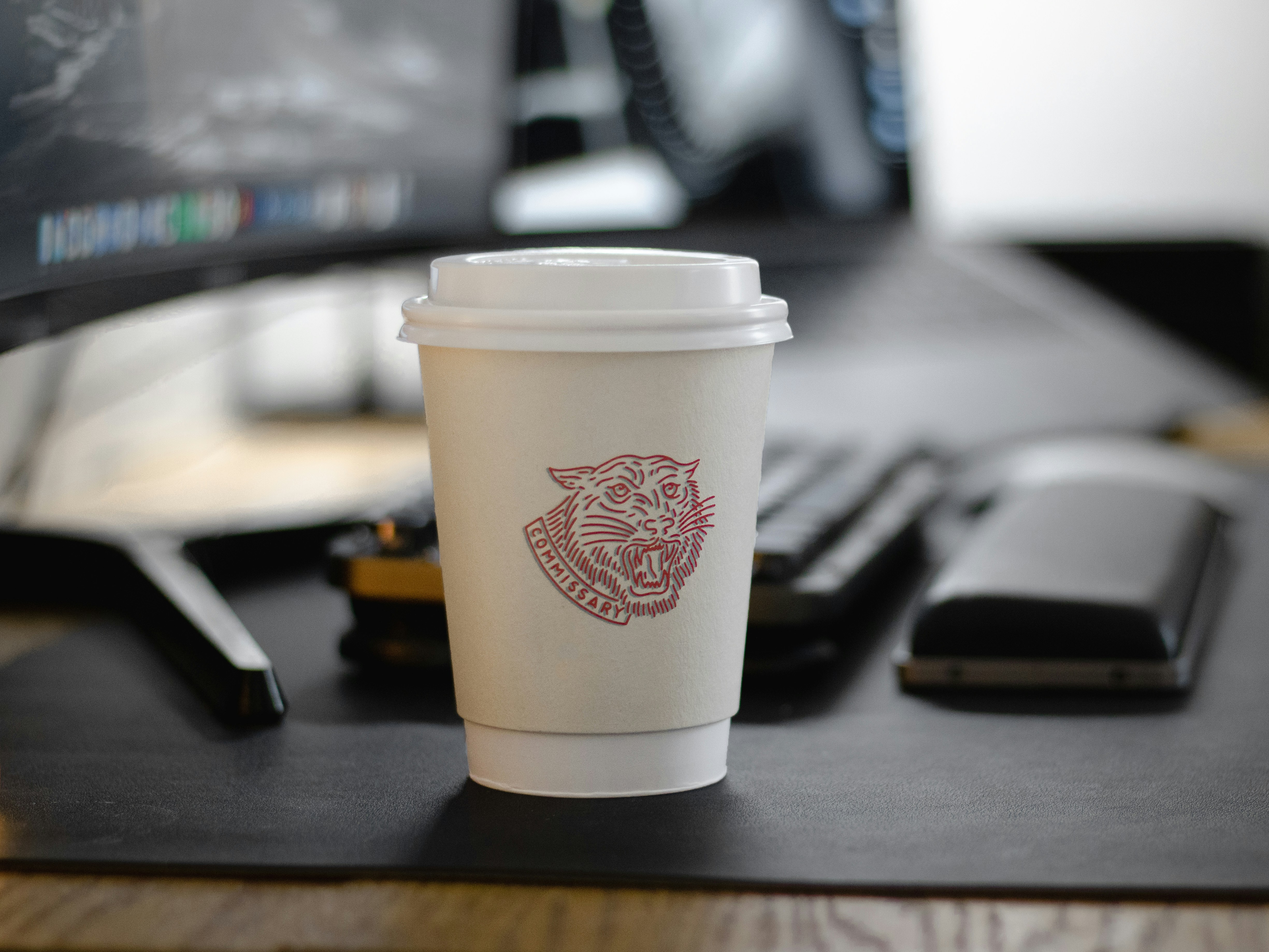 Tiger Logo Still Life on a Quiet Tech Desk