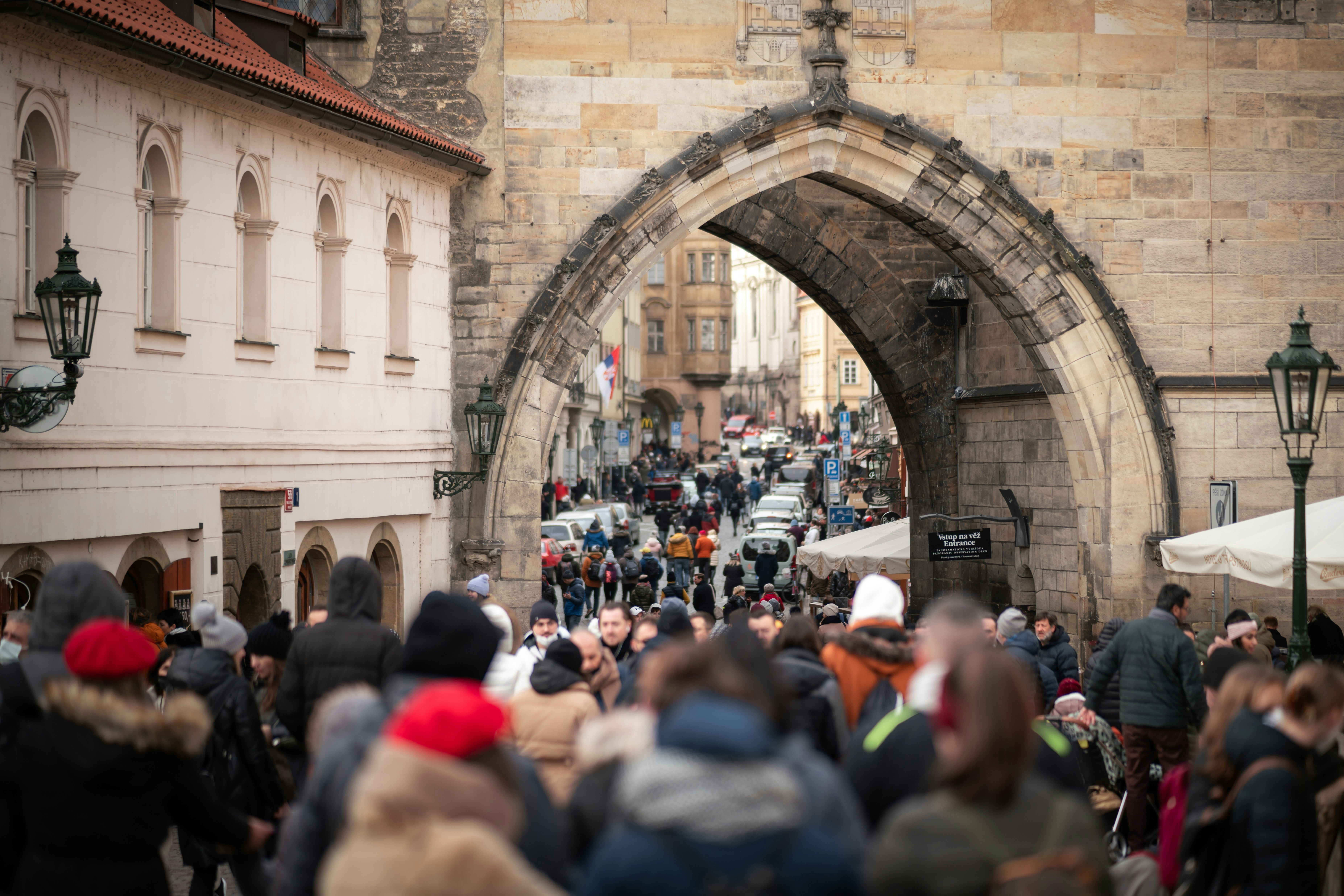 Archway Confluence: Faces and Footsteps Through a Historic Corridor