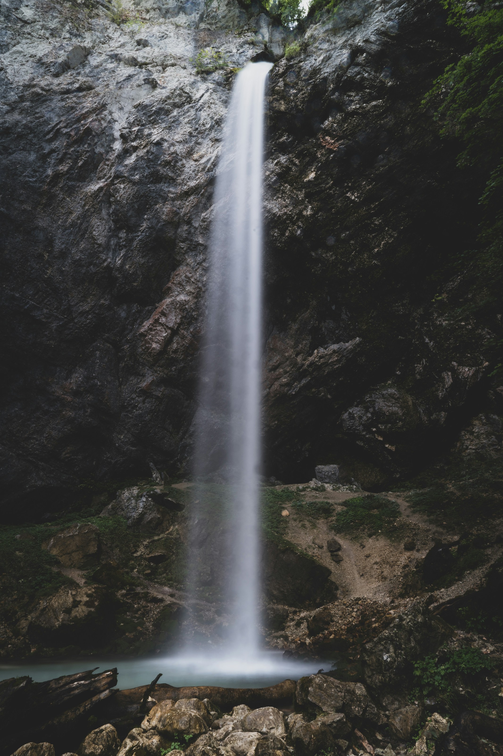 Nature's Liquid Veil: A Waterfall's Grace