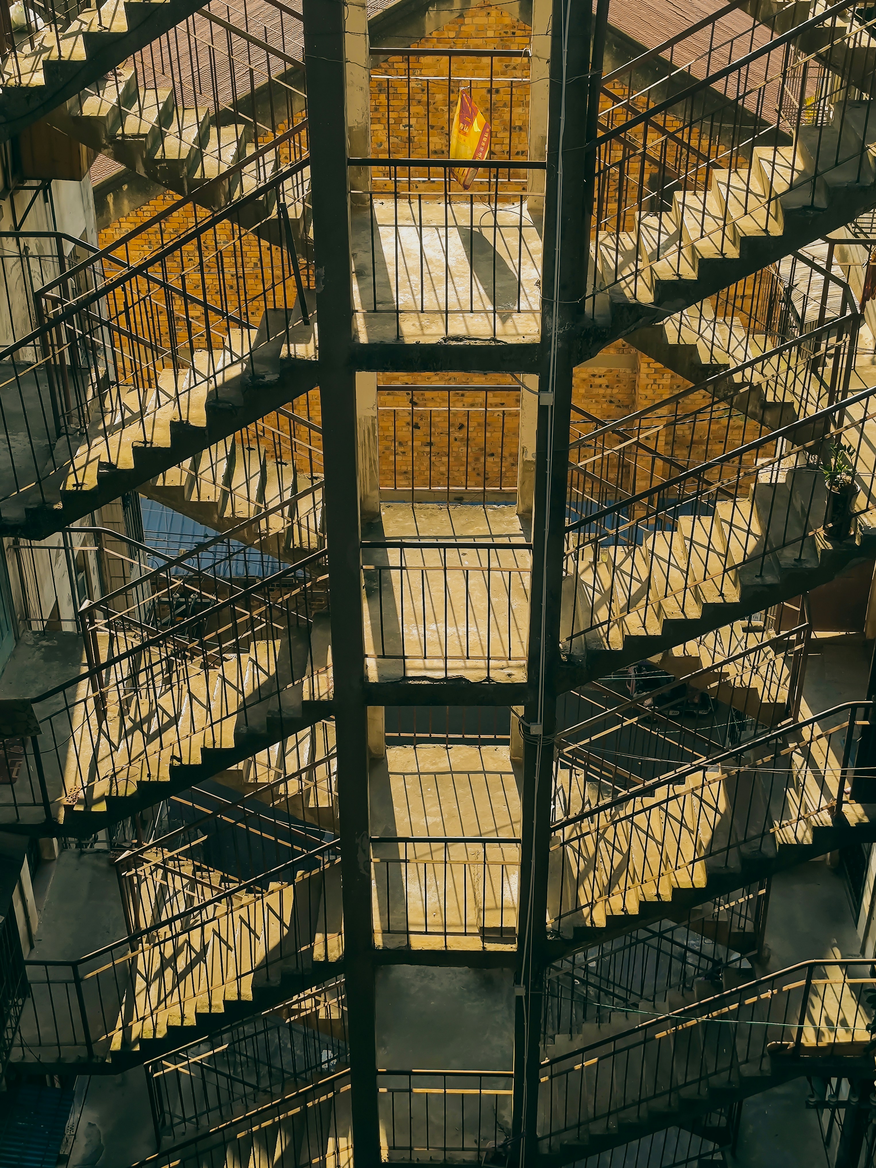 A bunch of cages are stacked on top of each other photo – Free Handrail ...