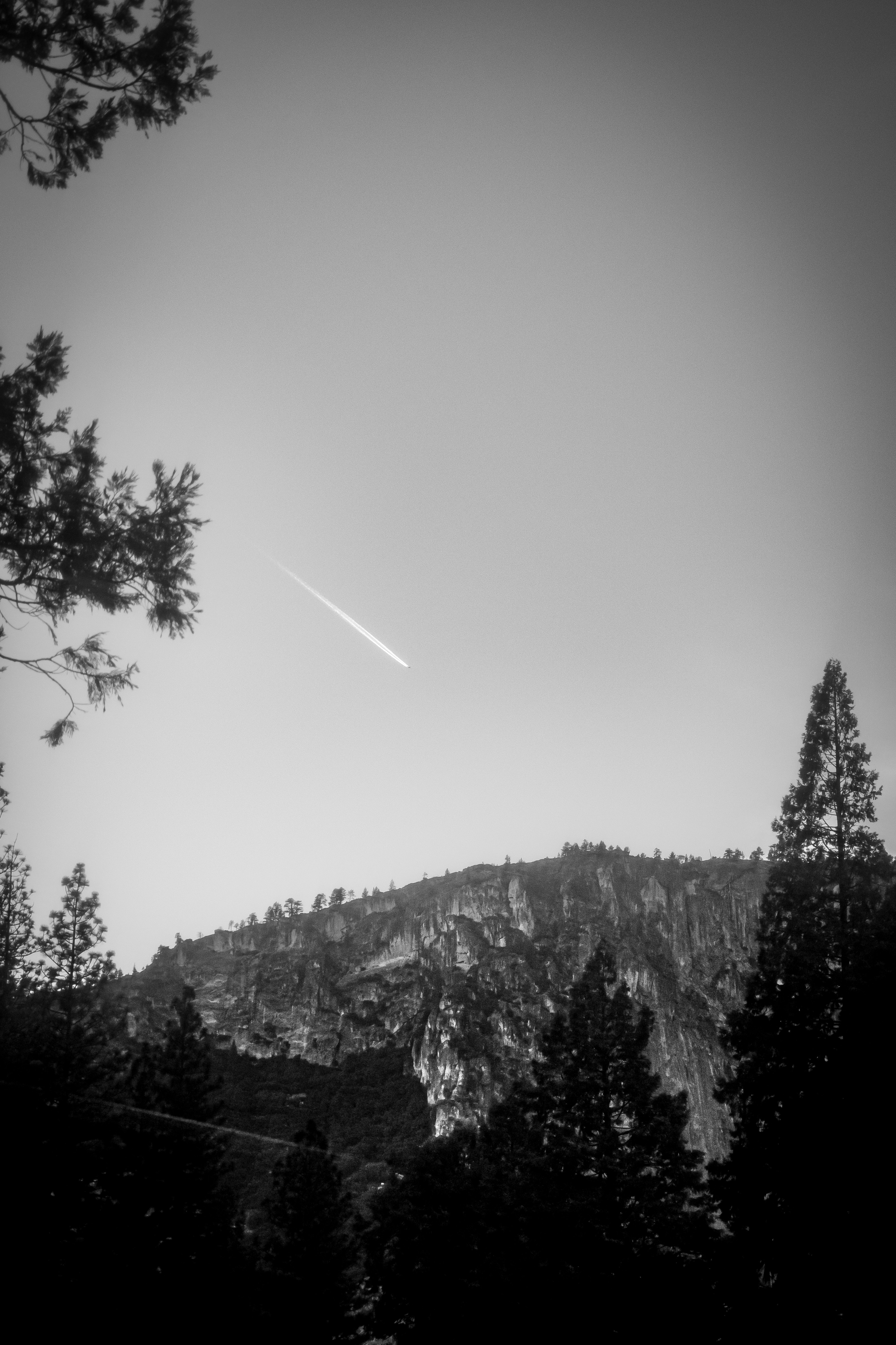 Meteor Thread Across a Moonlit Valley