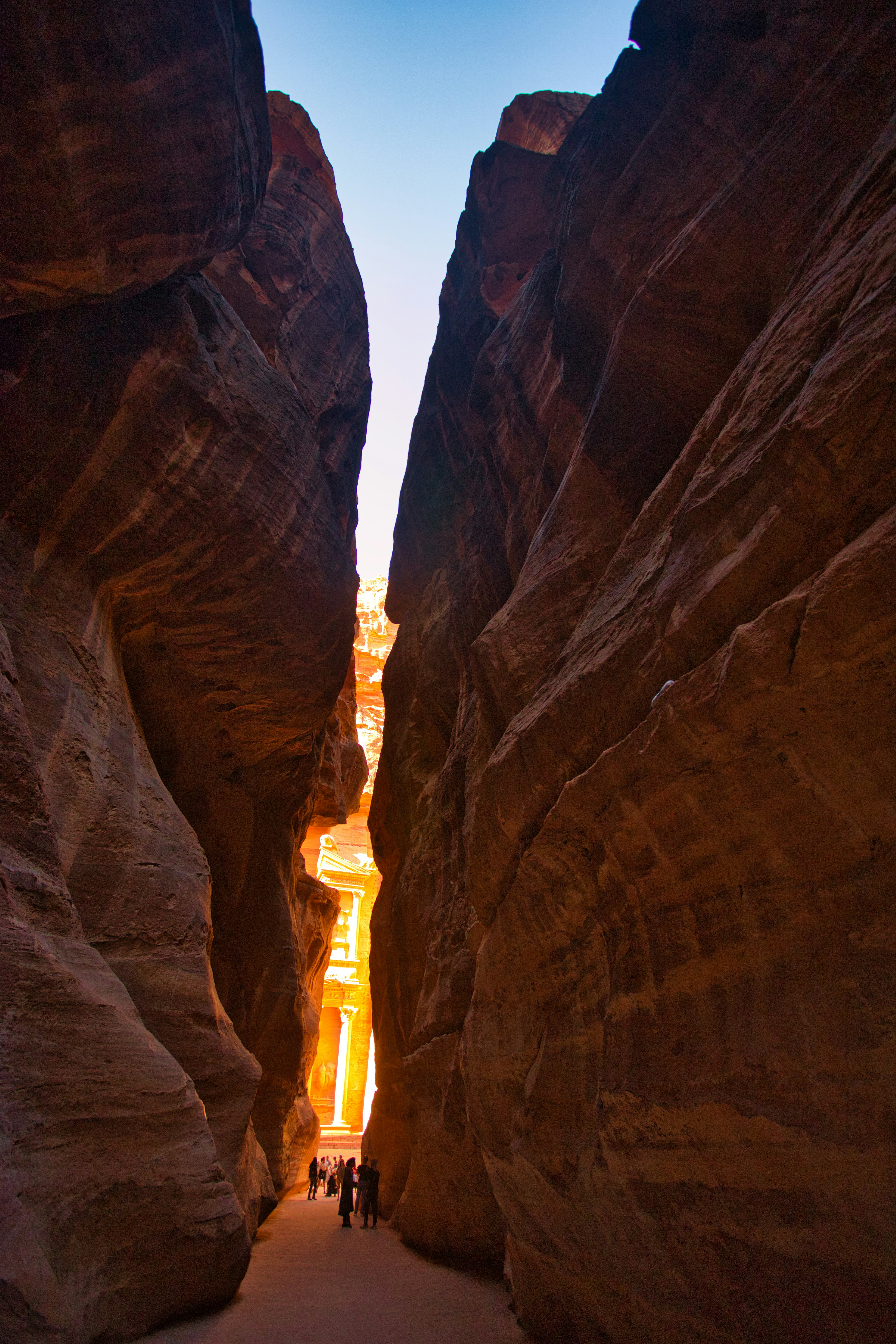Sunlit Portal Between Crimson Cliffs: A Desert Canyon Framing a Glowing Facade