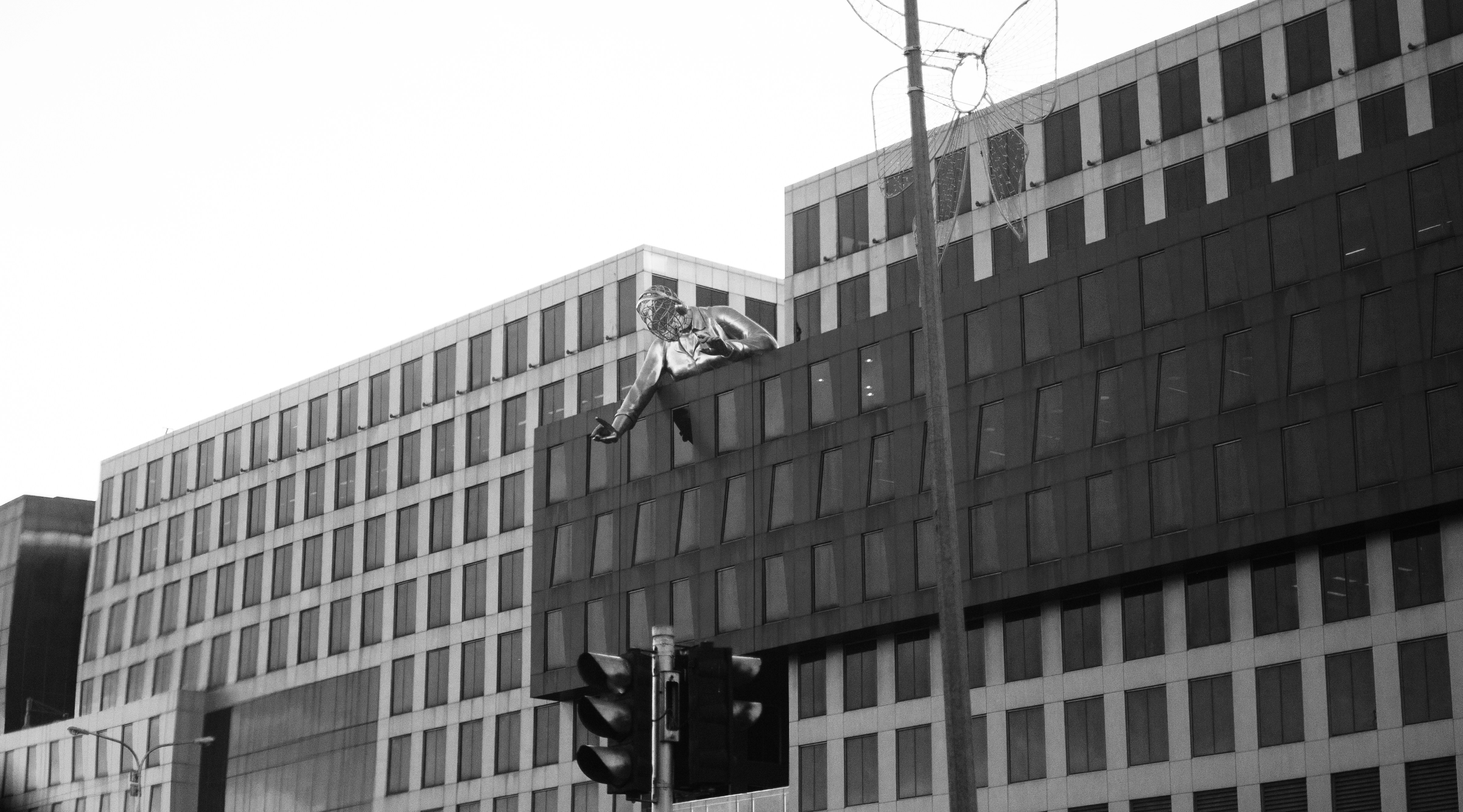 Urban Acrobat: Helpline Aerial on the City Facade