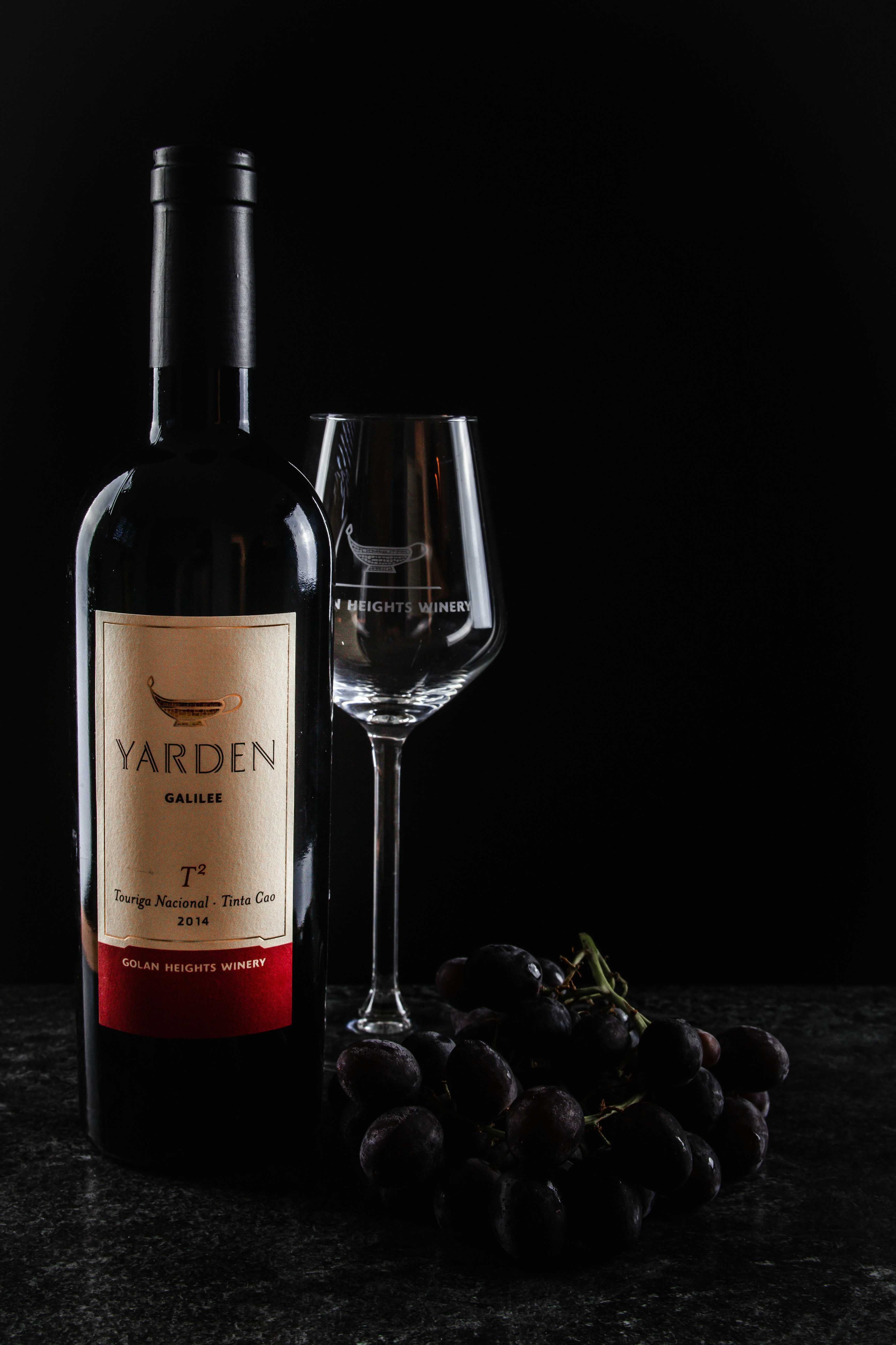 A bottle of wine next to a glass of wine photo – Free Alcohol Image on ...