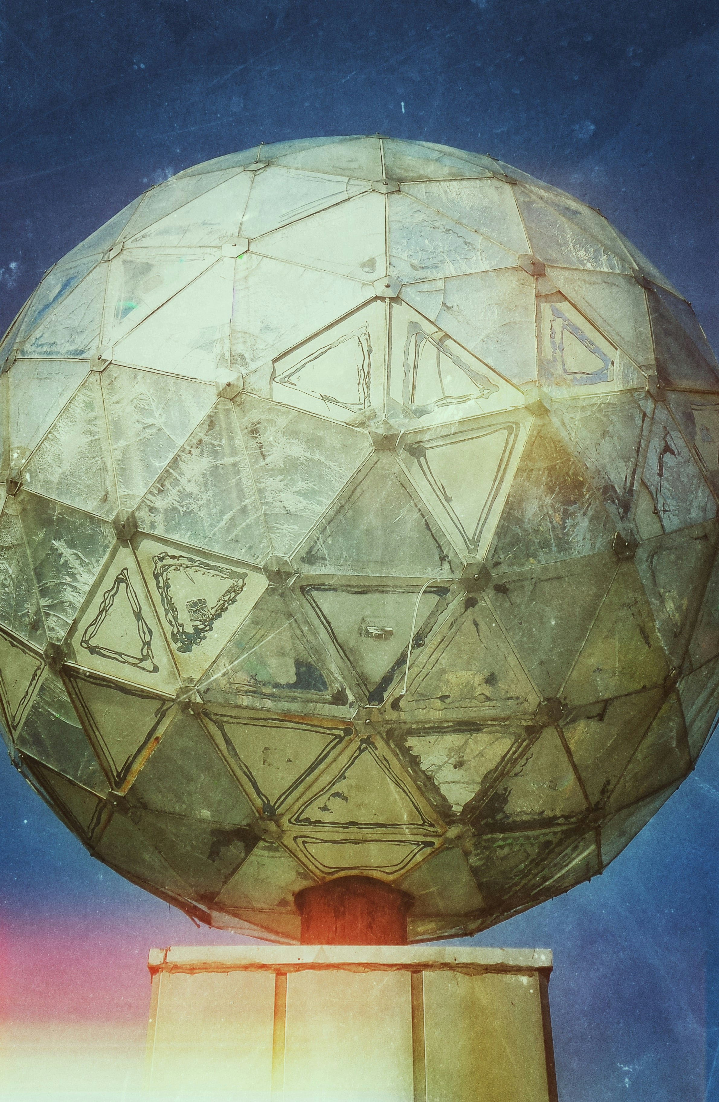 A large glass object sitting on top of a building photo – Free Sphere ...