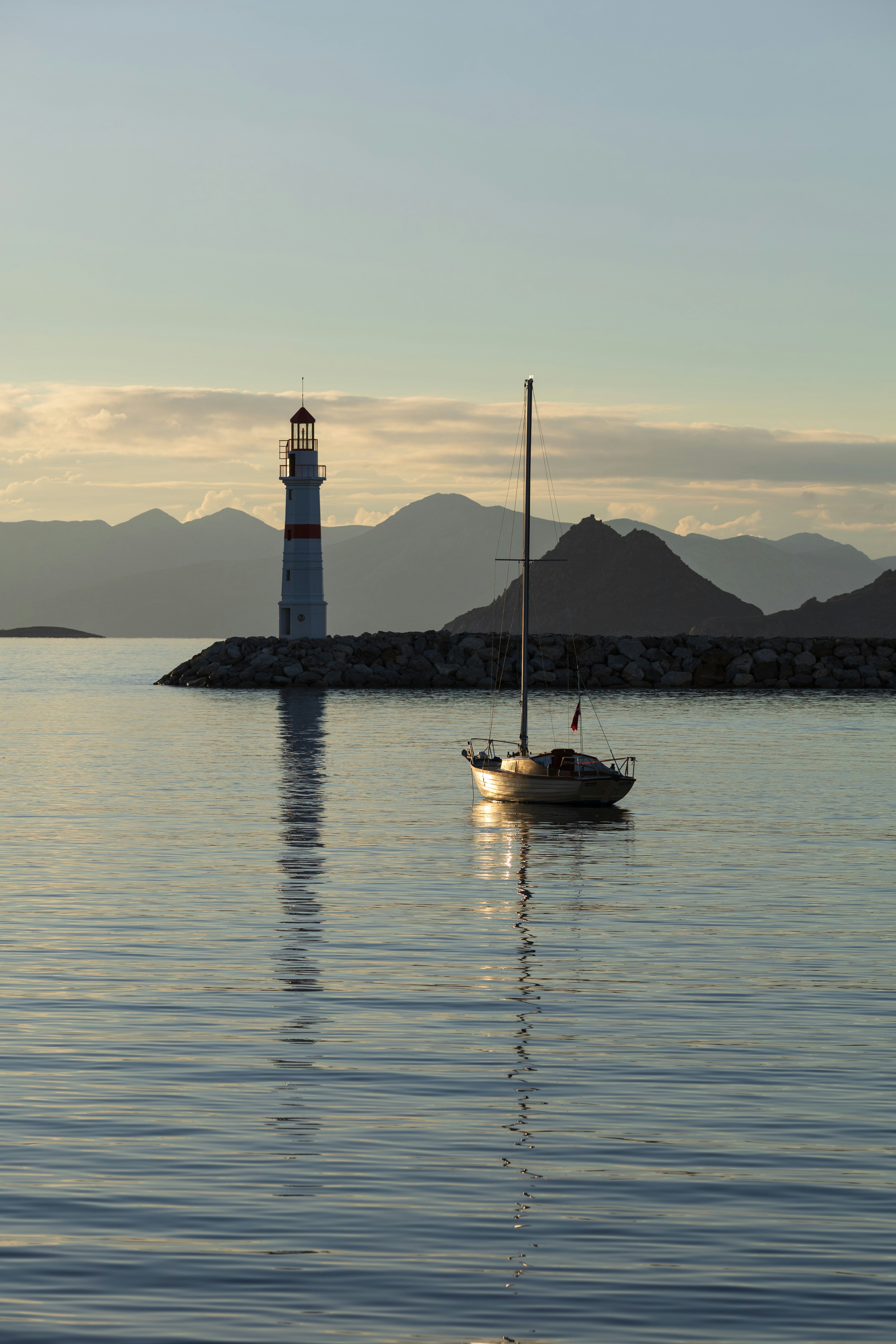 Sailboat at the Lighthouse Gate