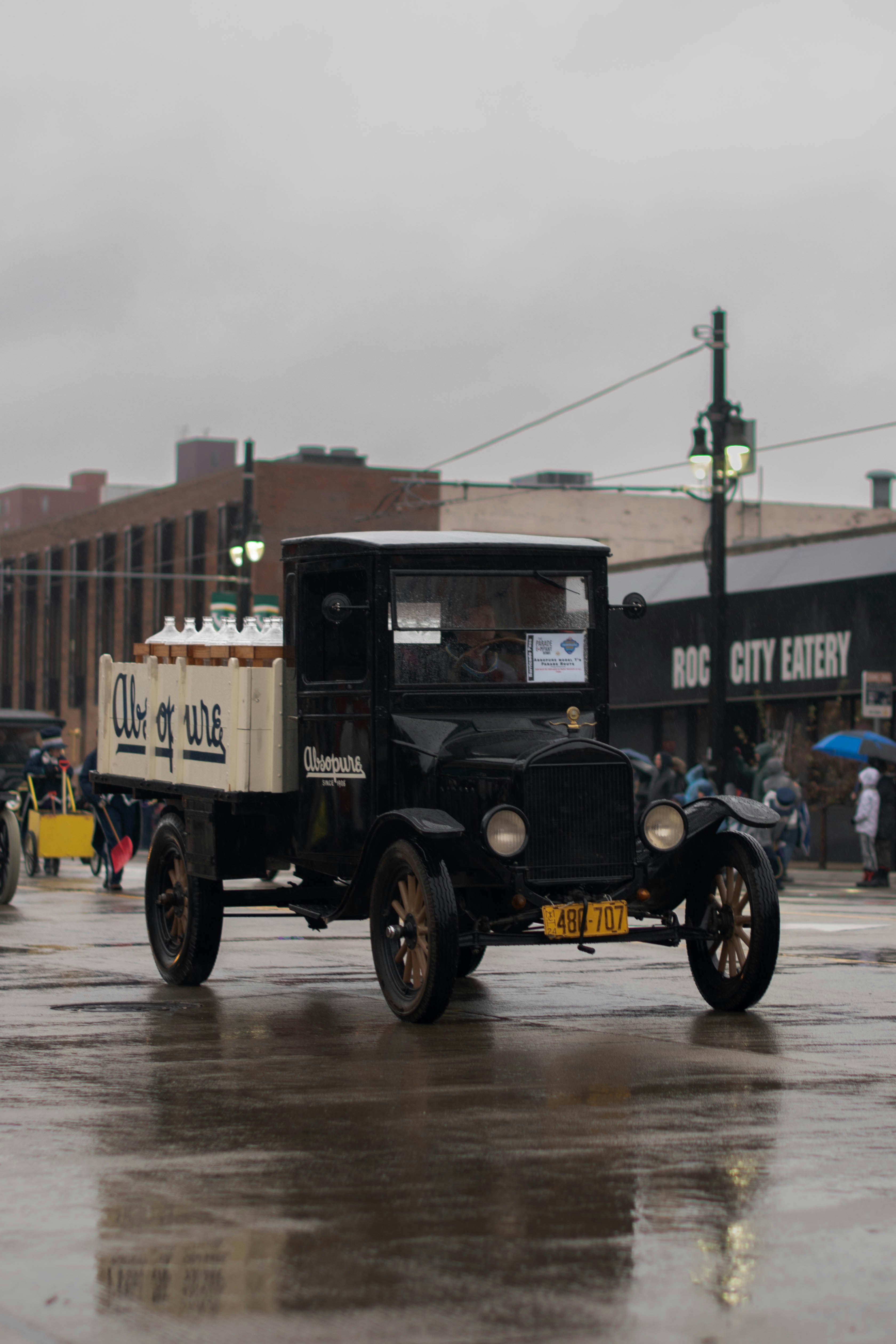Vintage Firewagon Crossing a Wet Main Street