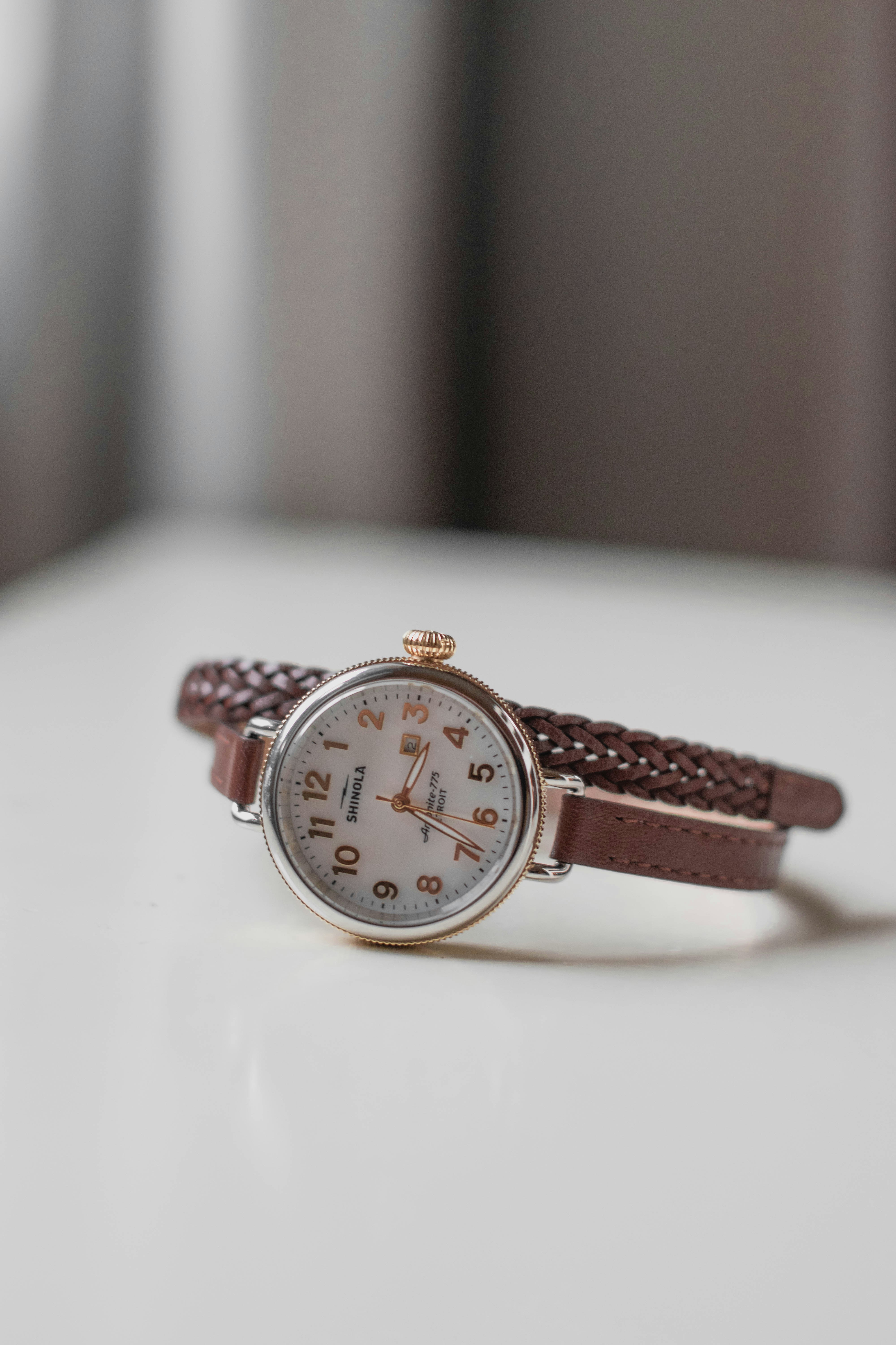 A close up of a wrist watch on a table photo – Free Wristwatch Image on ...