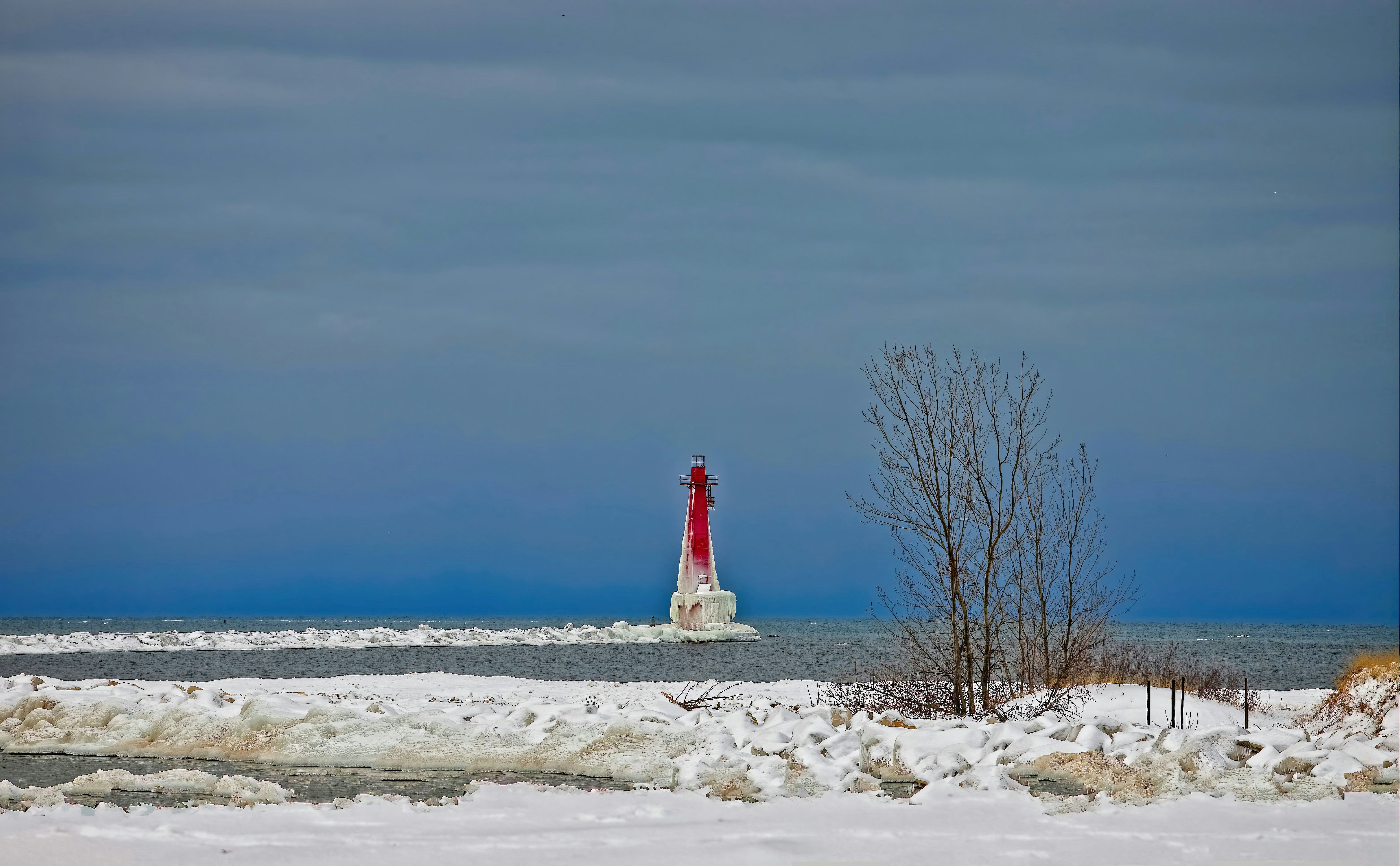 Crimson Lantern at the Edge of the Snowbound Sea