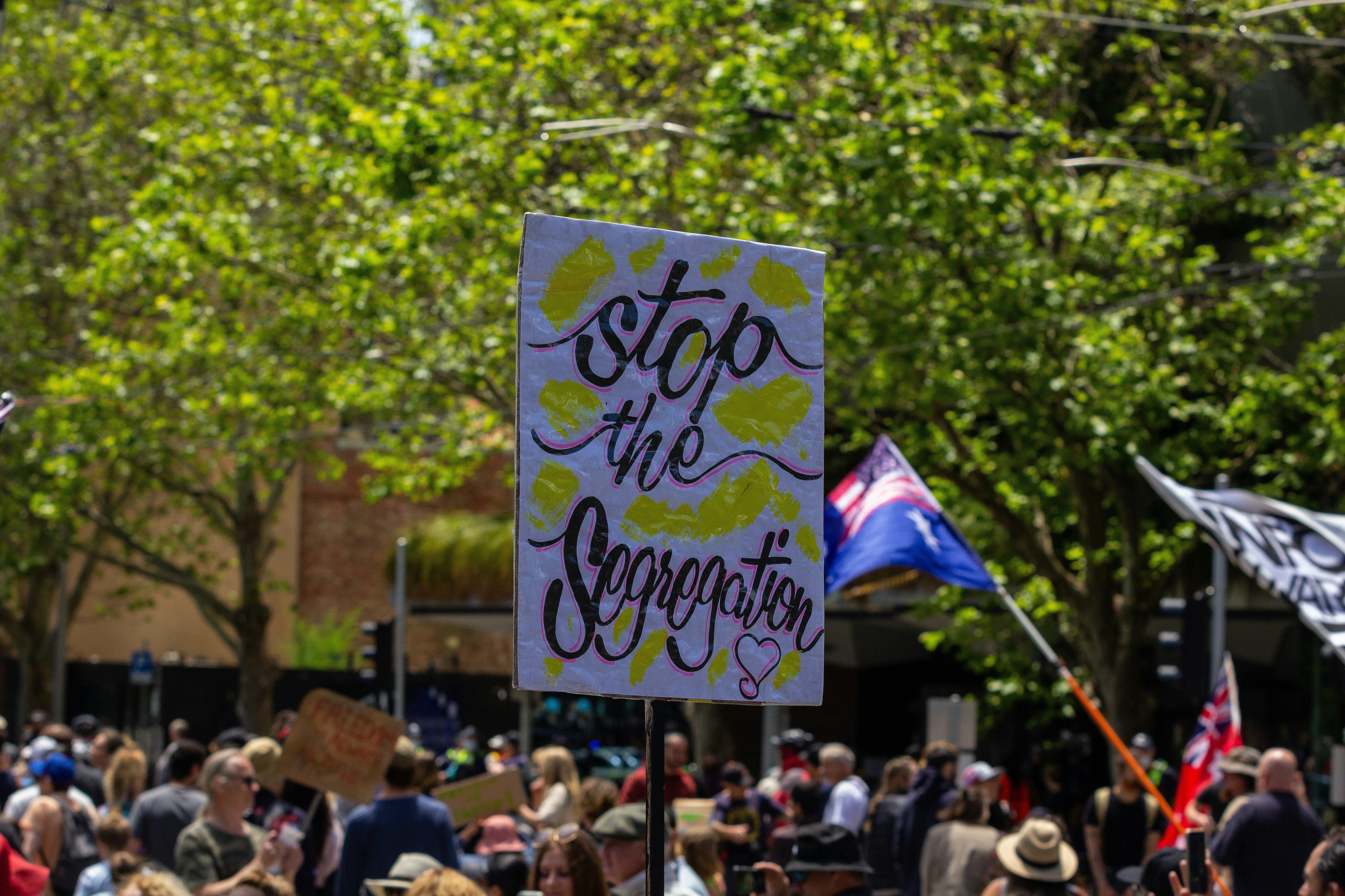 A group of people holding signs and flags photo – Free Australia Image ...
