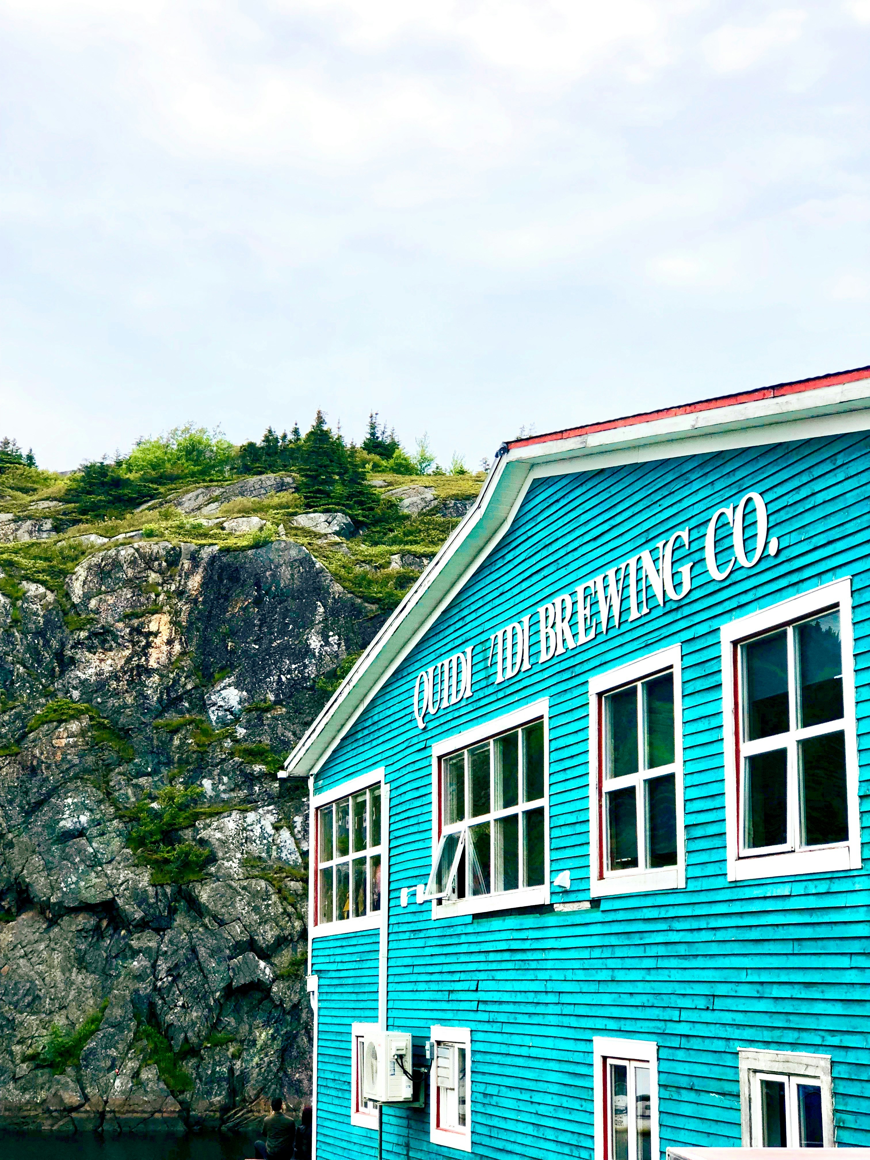 Azure Timber by the Sea: A Coastal Brew House Rising from the Rocks
