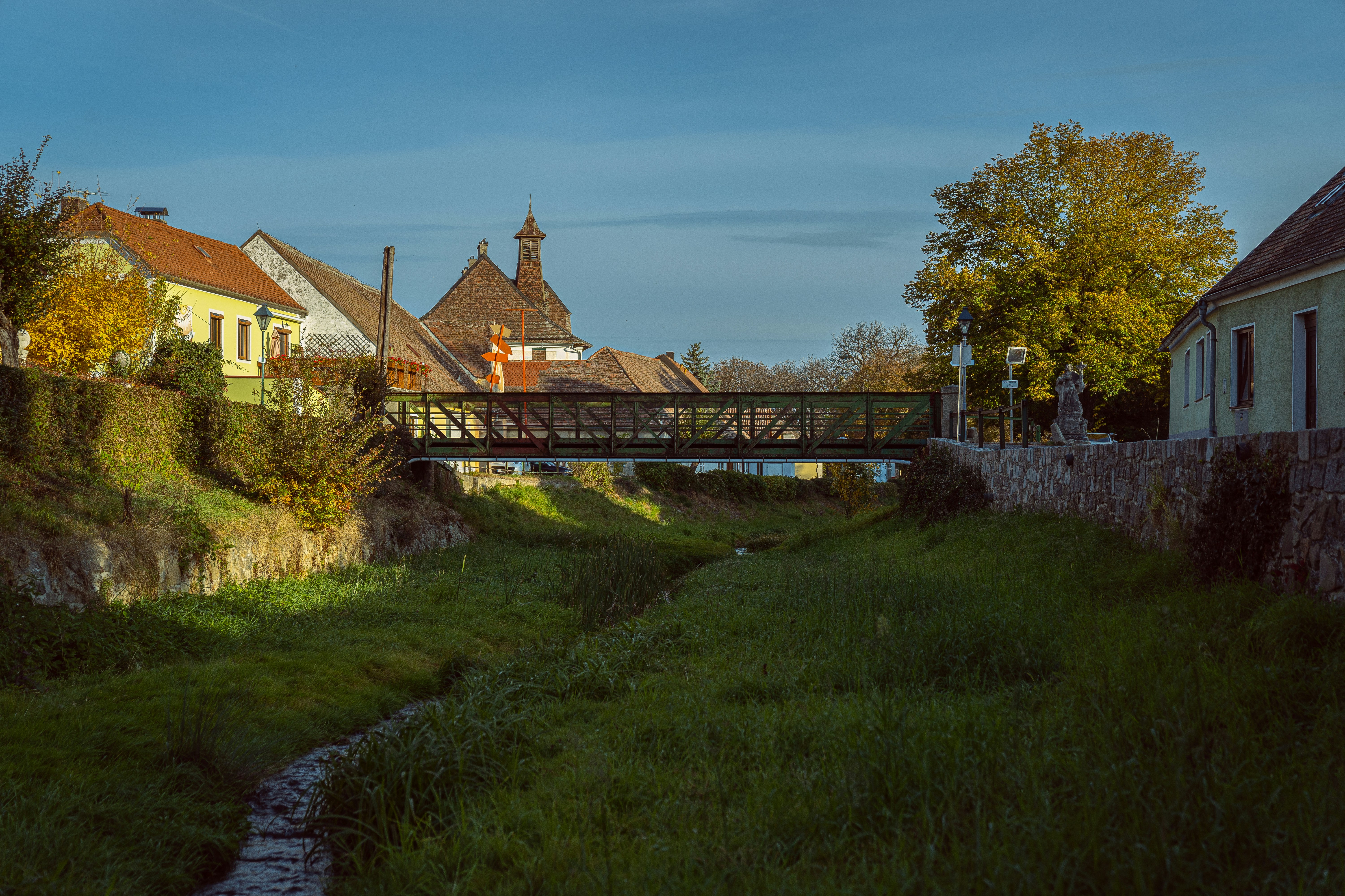 A bridge over a stream in a small village photo – Free Austria Image on ...