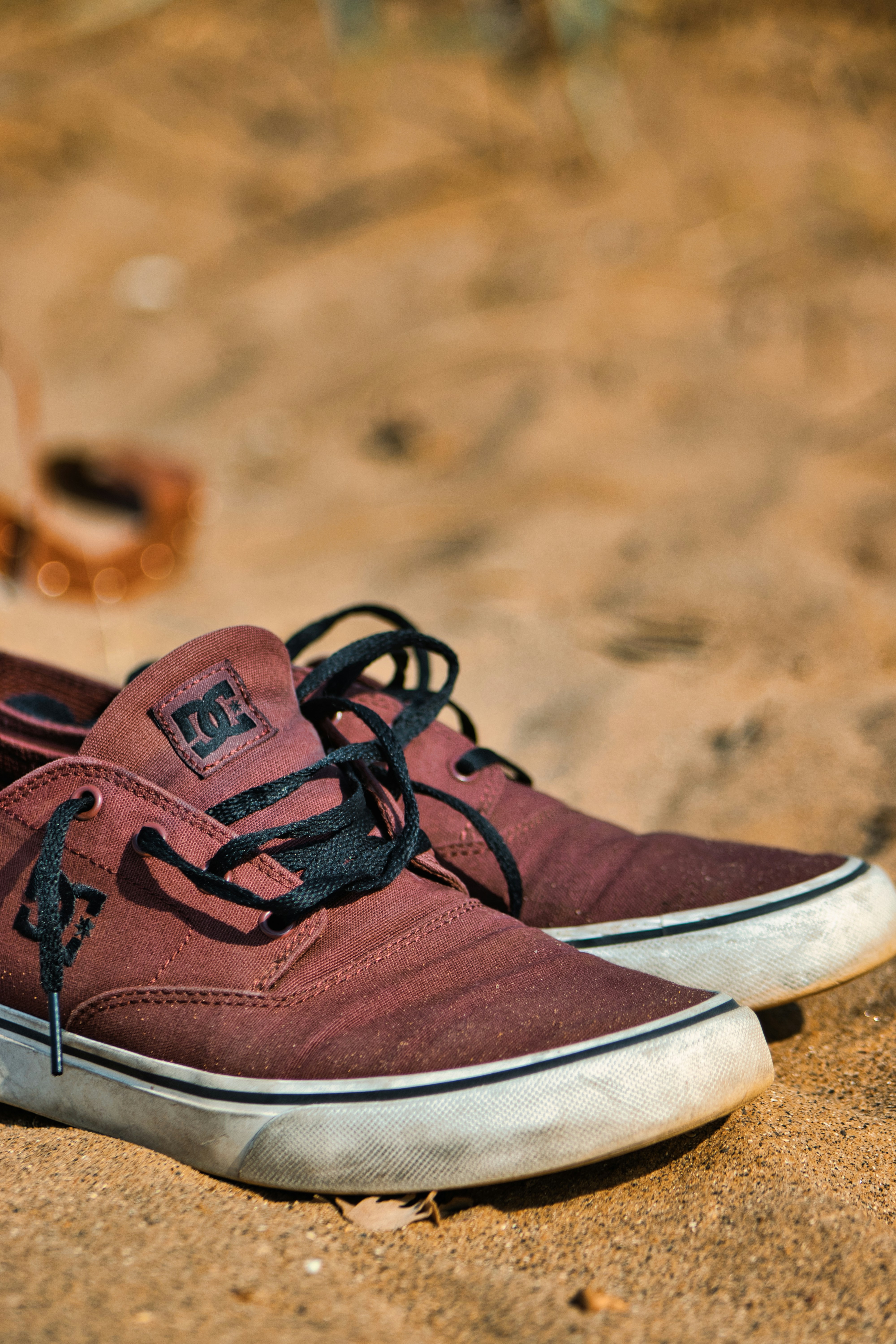a close up of a pair of shoes on the ground