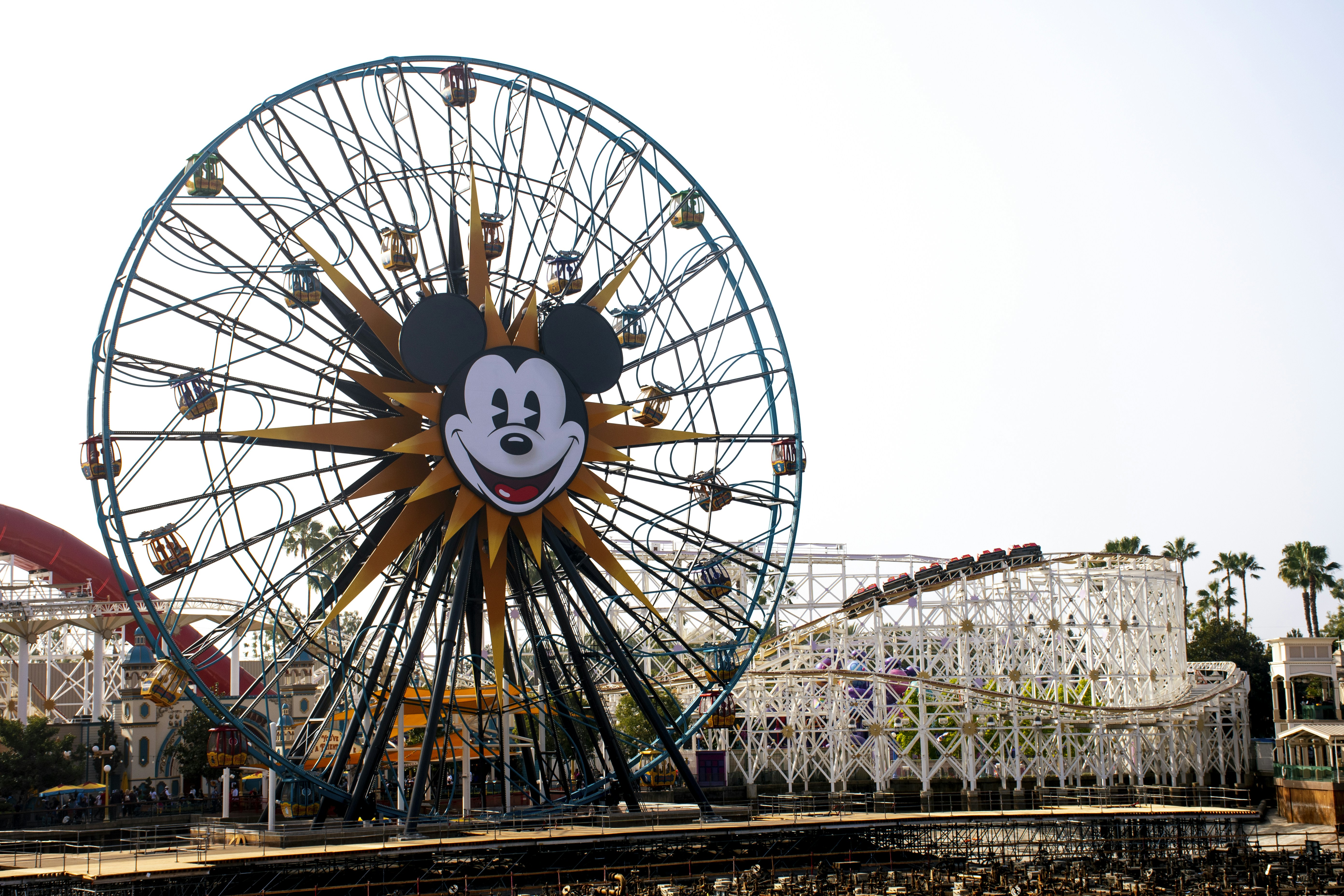 A ferris wheel with a mickey mouse face on it photo – Free Disneyland ...