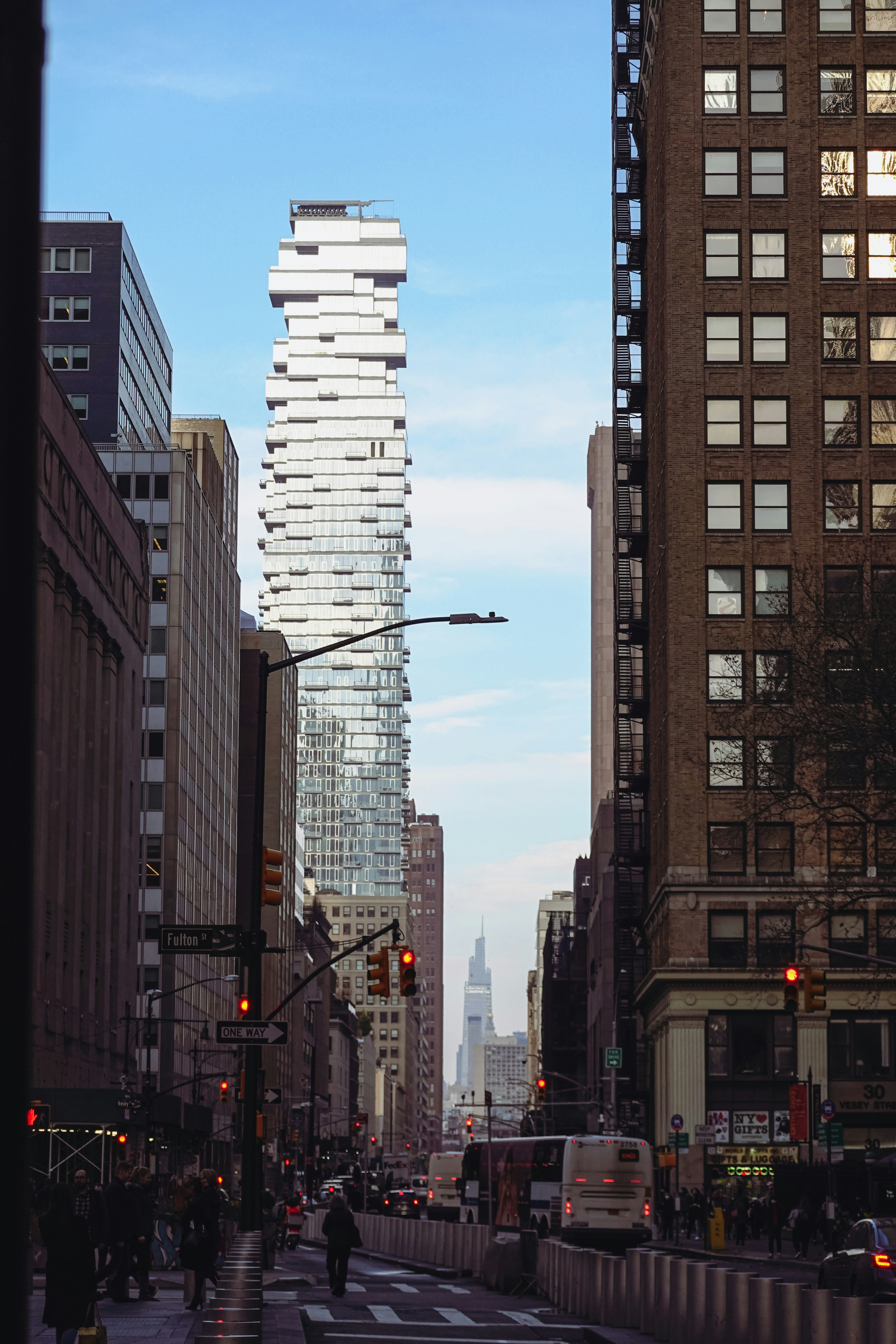 City Skyline Threading the Afternoon: A Tower of Opposites