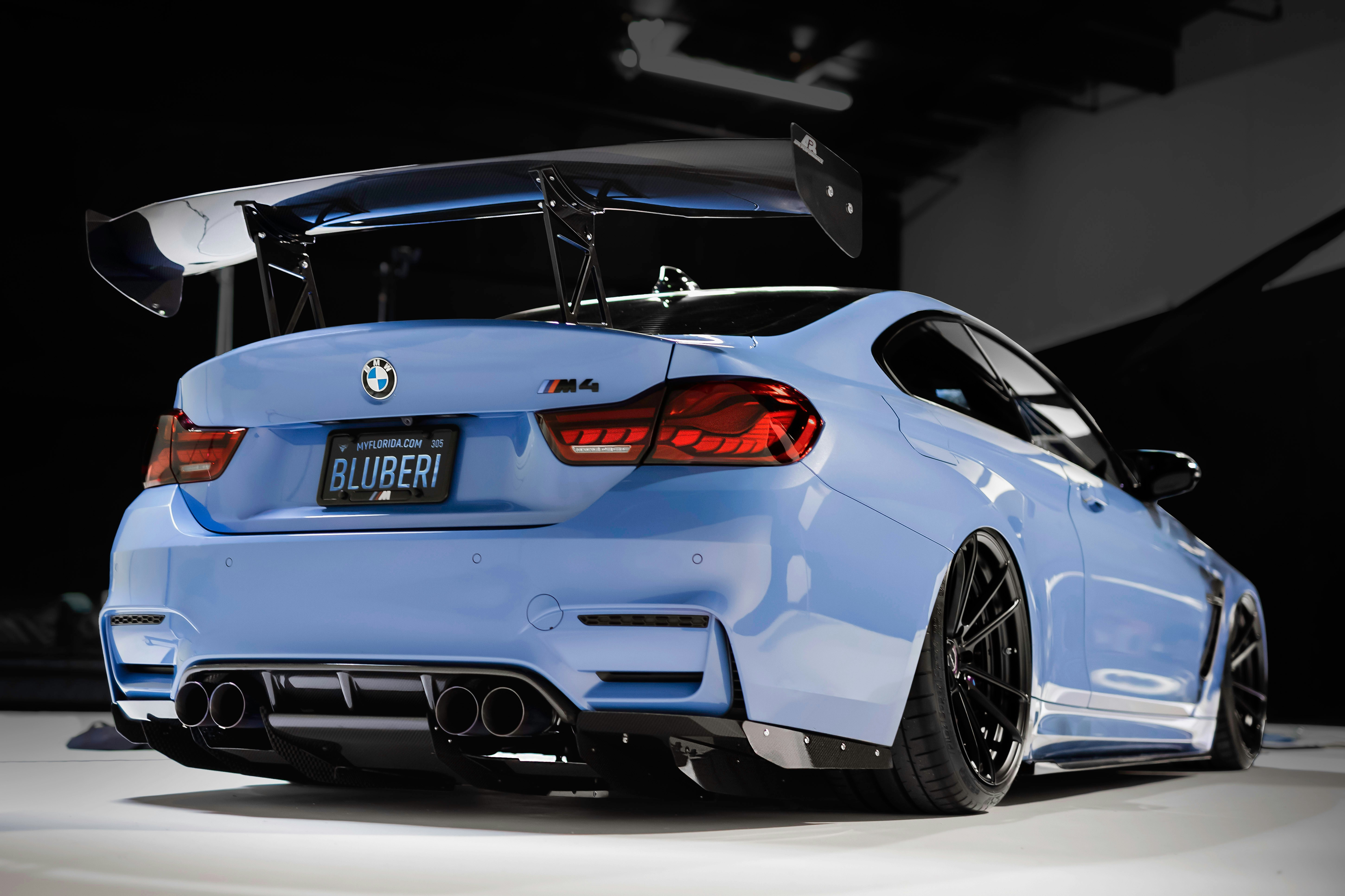 A light blue bmw car with its trunk open photo – Free Orlando Image on ...