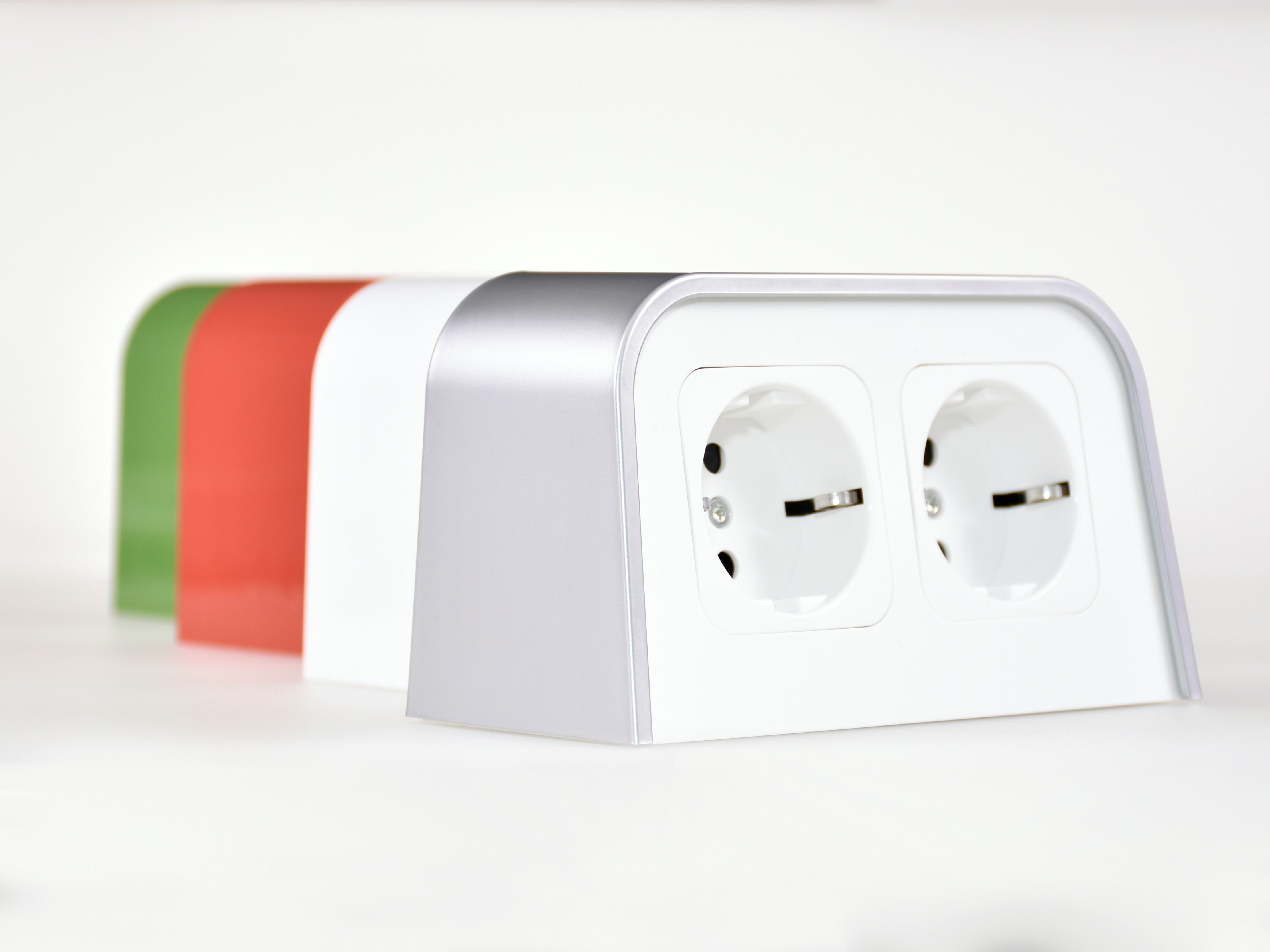 A couple of plugs that are sitting on a table photo – Free White Image ...