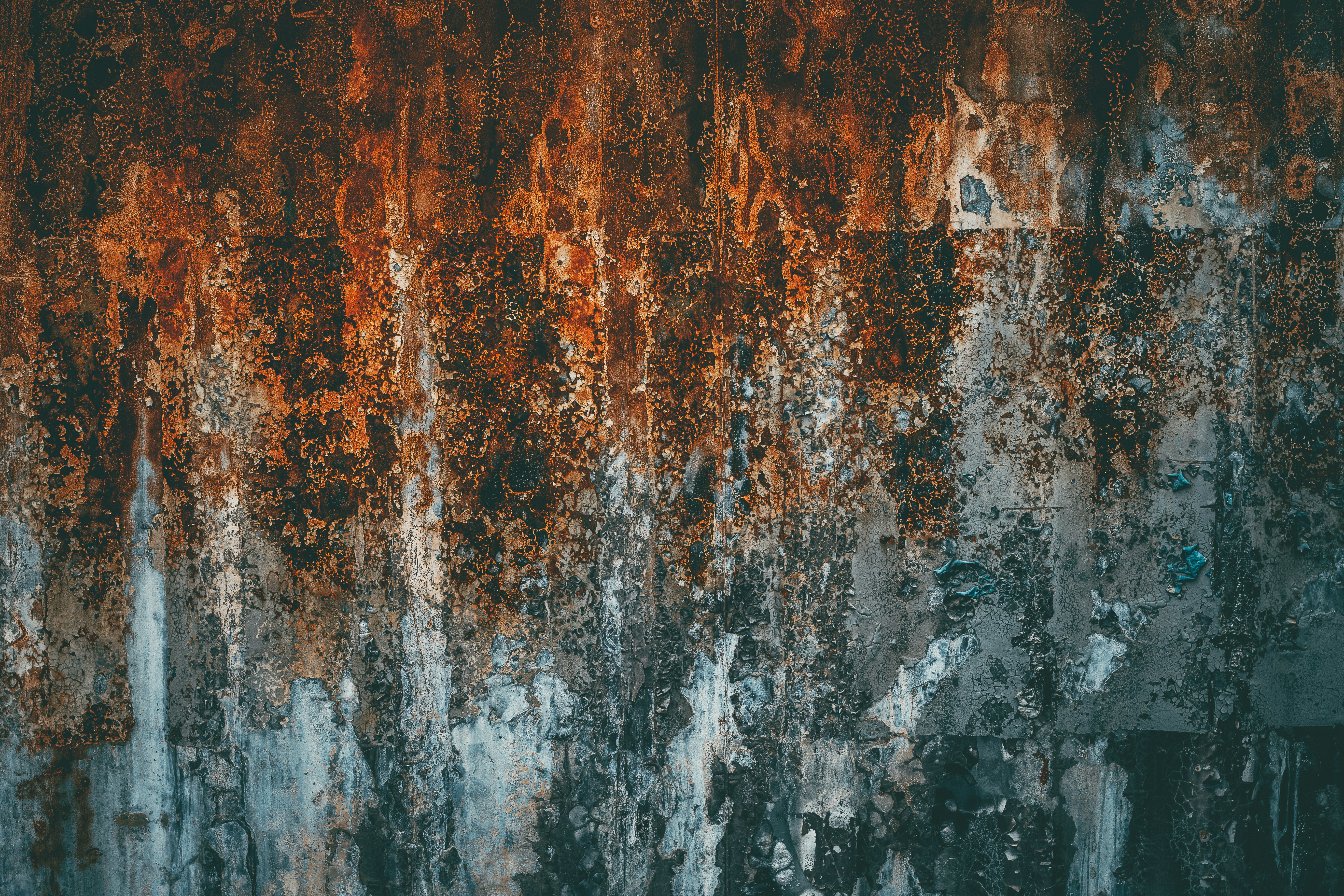 A rusted metal wall with lots of rust on it photo – Free Rust Image on ...