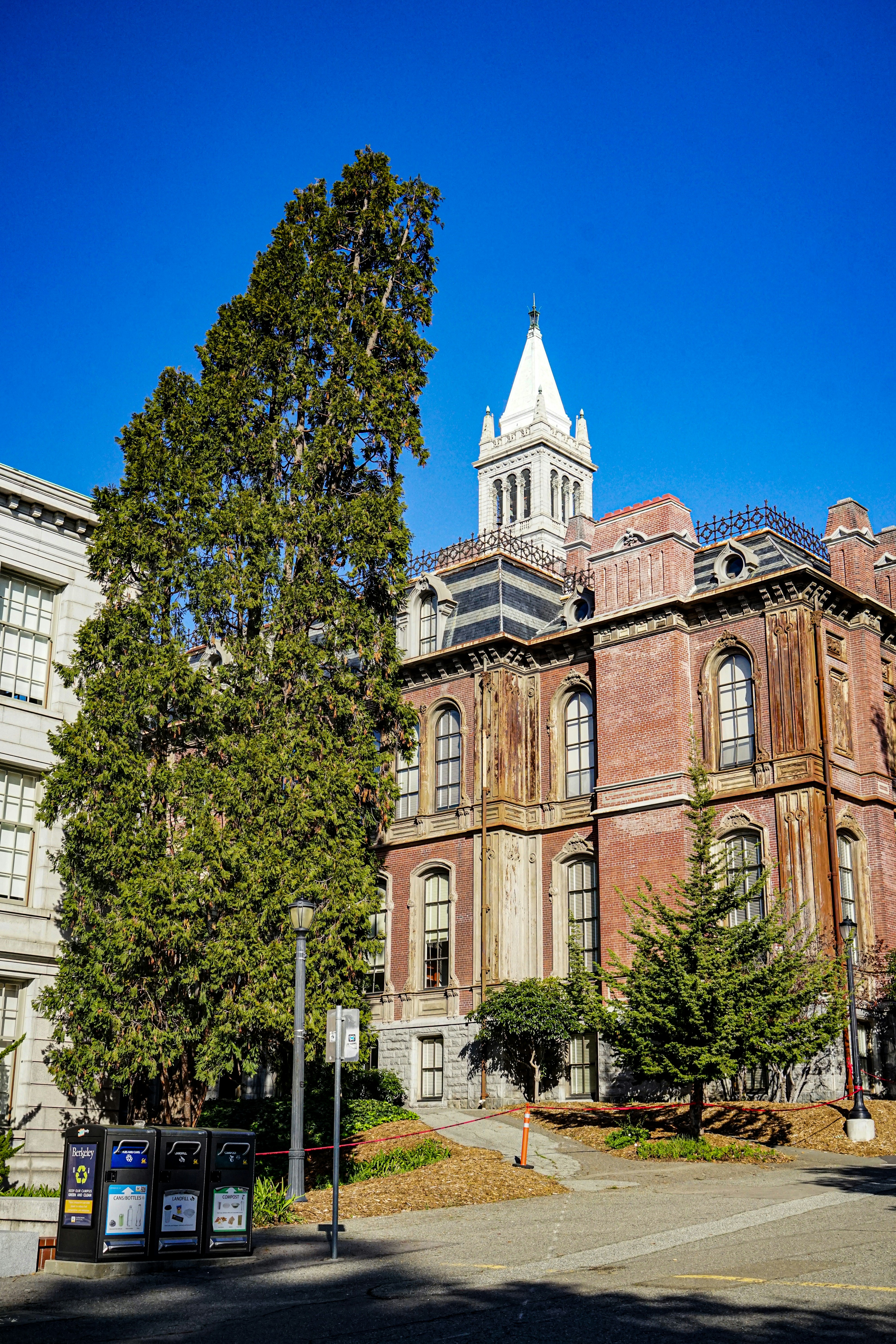 A large building with a clock tower on top of it photo – Free Berkeley ...