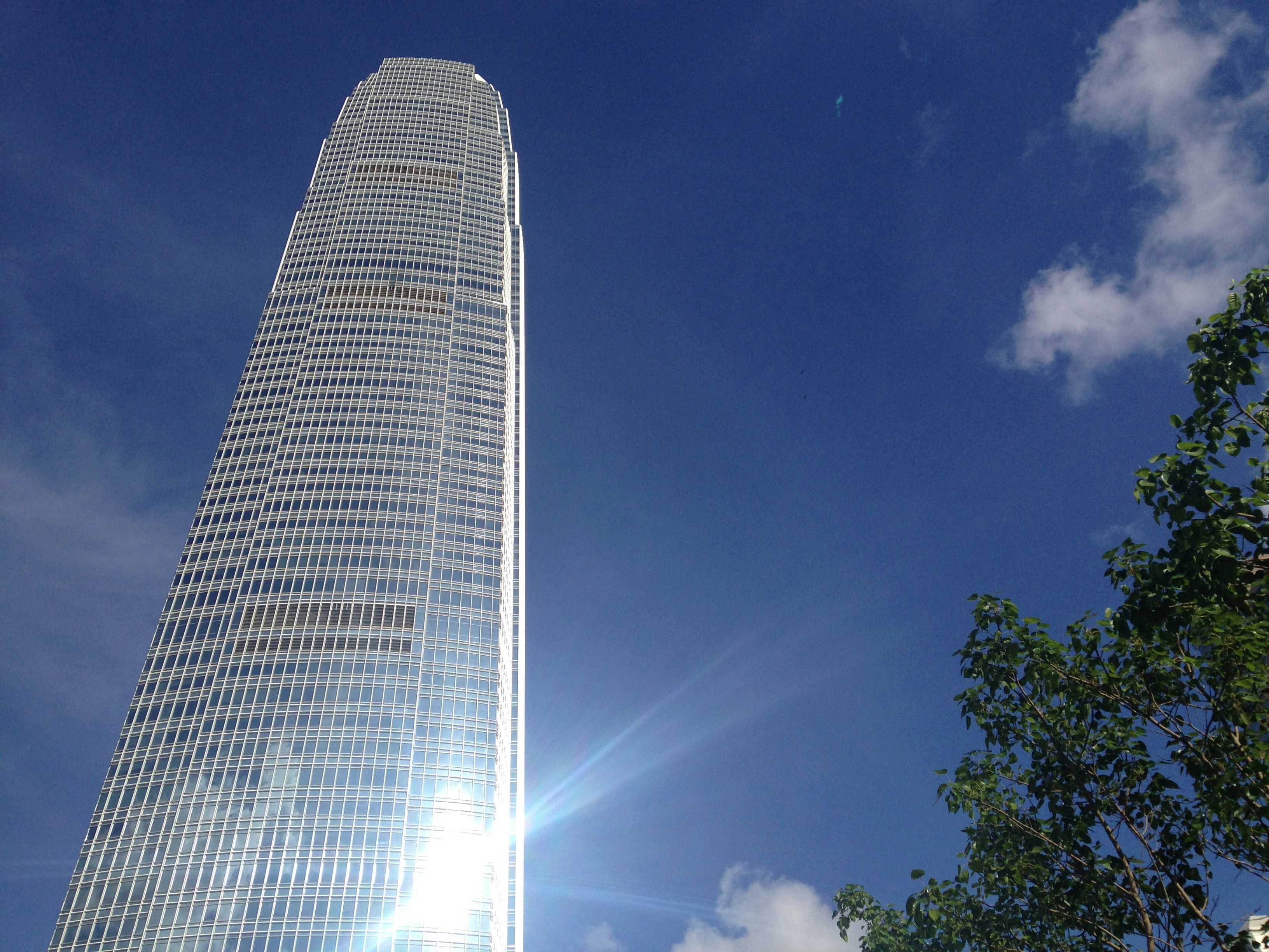 A large tall tower with a sky background photo – Free Hong kong Image ...